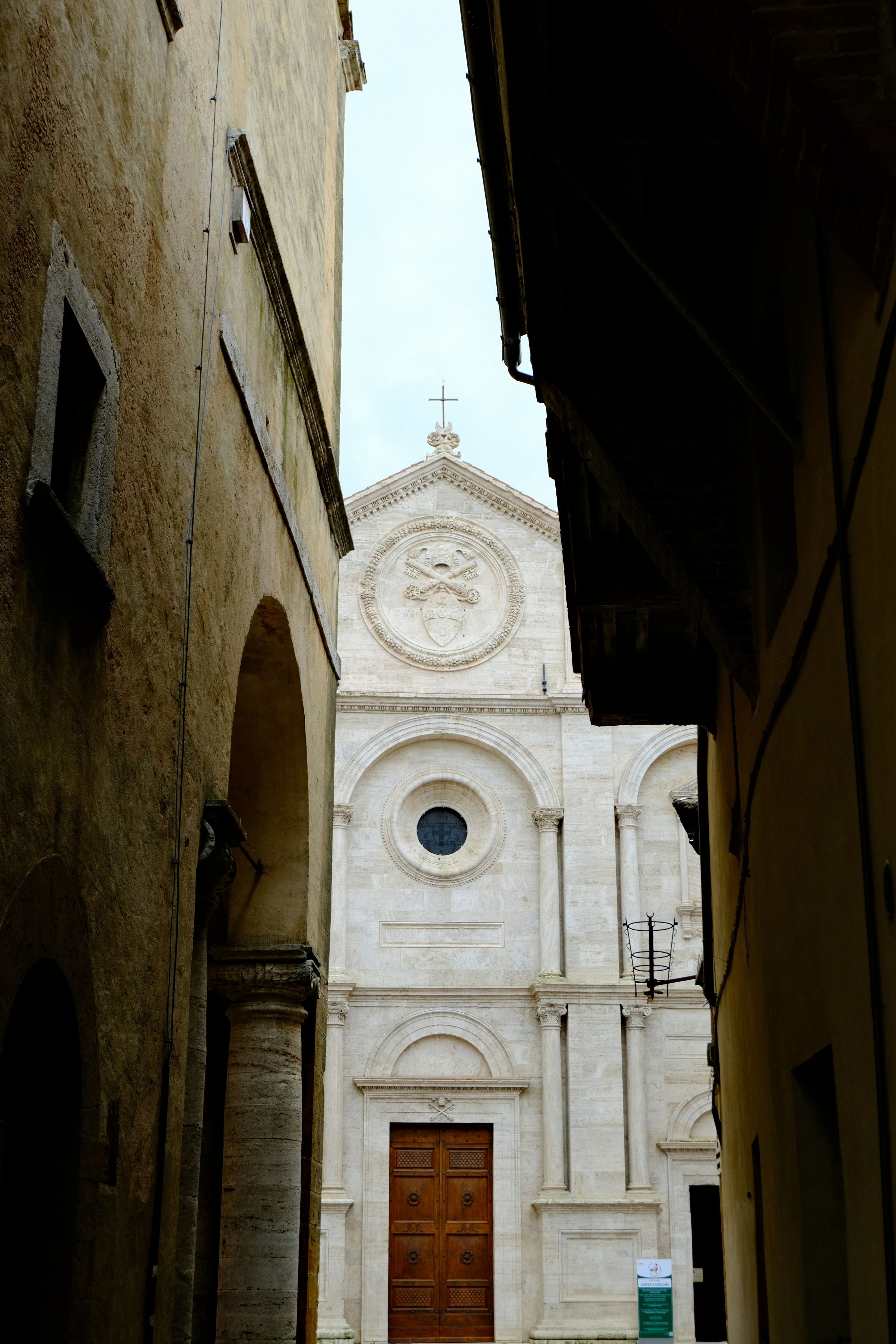 Narrow Alley to a Sunlit Facade