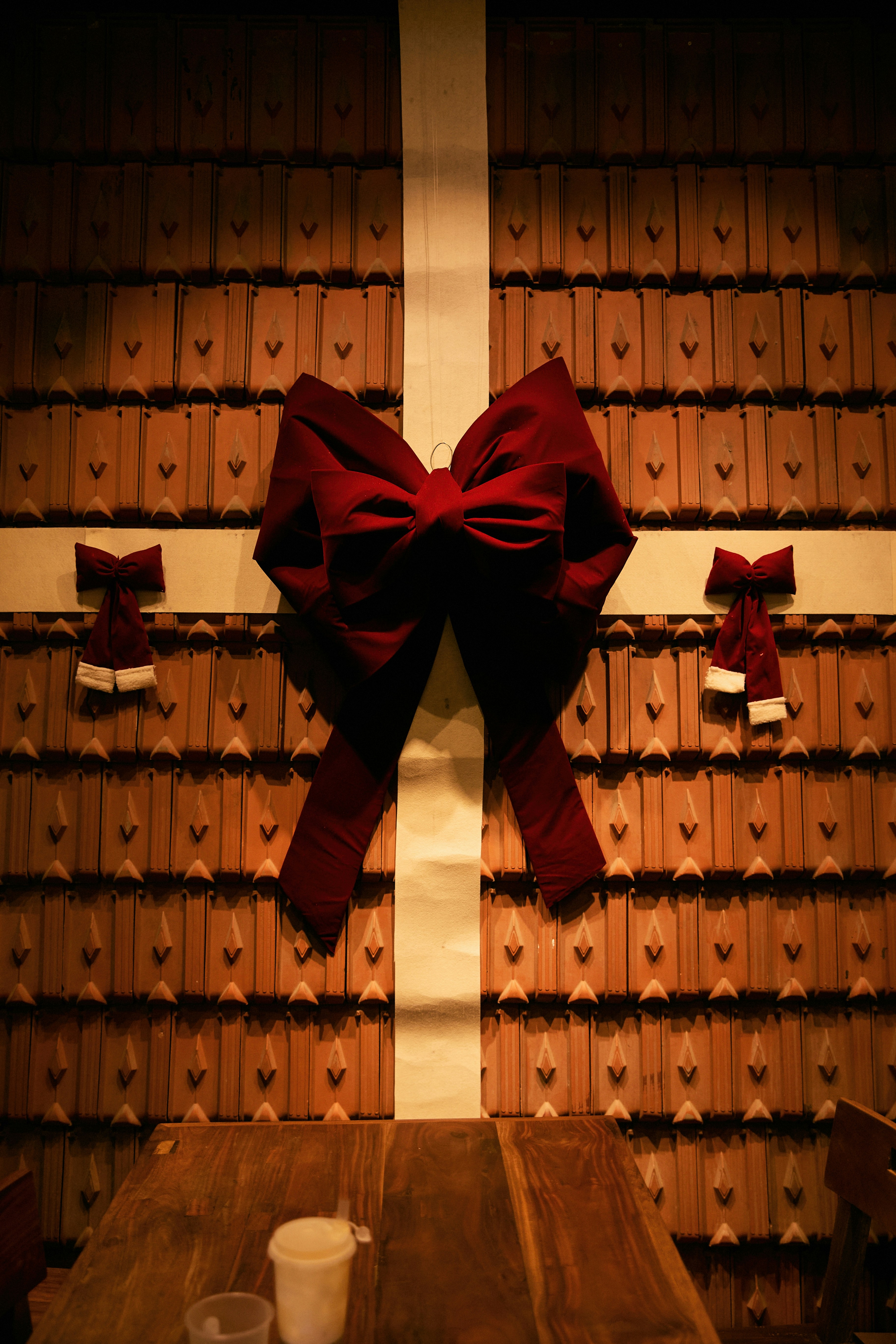 The Grand Velvet Bow: A Christmas Doorway's Focal Point