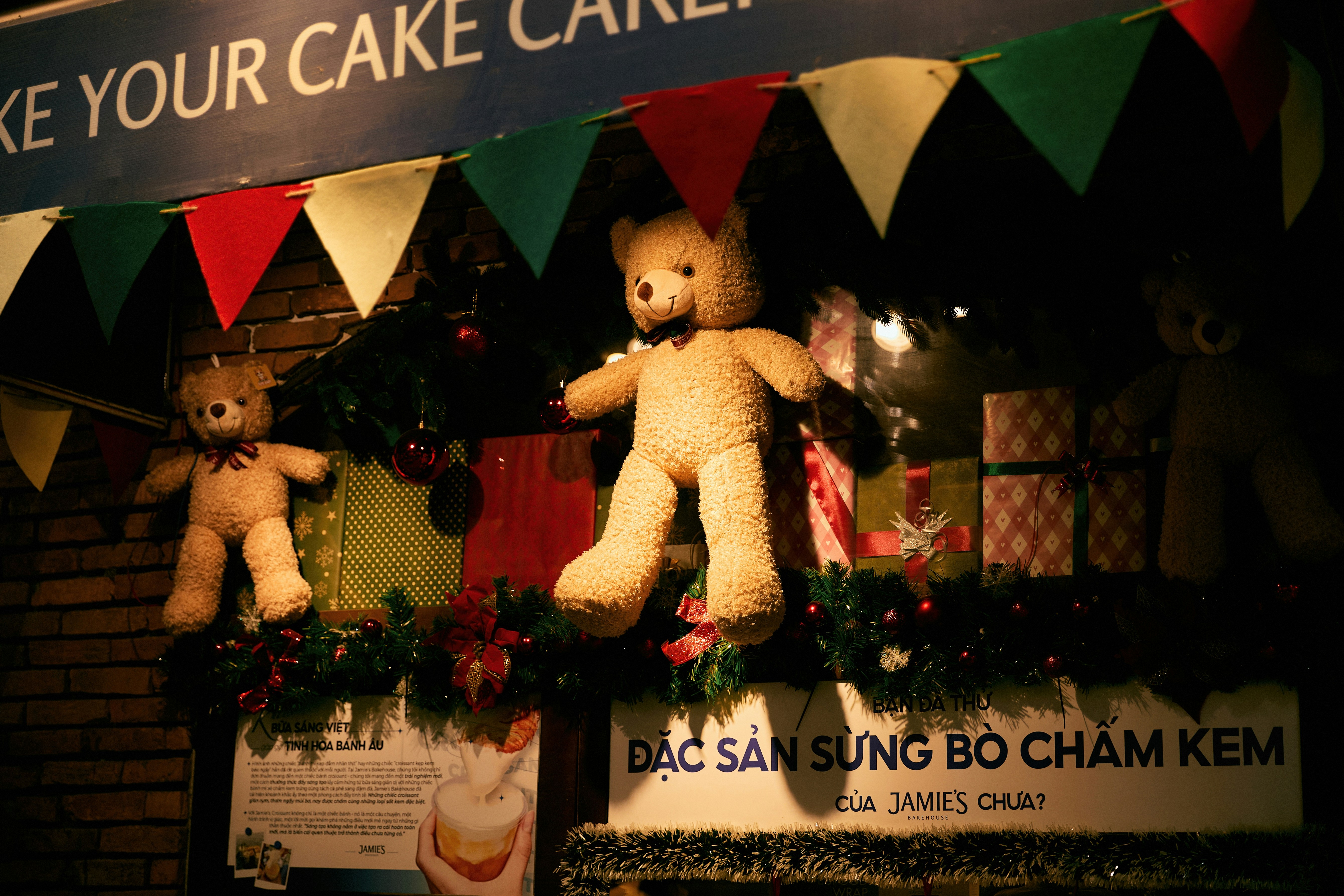 Centerpiece of Plush: Bears Over a Cozy Bakery Display
