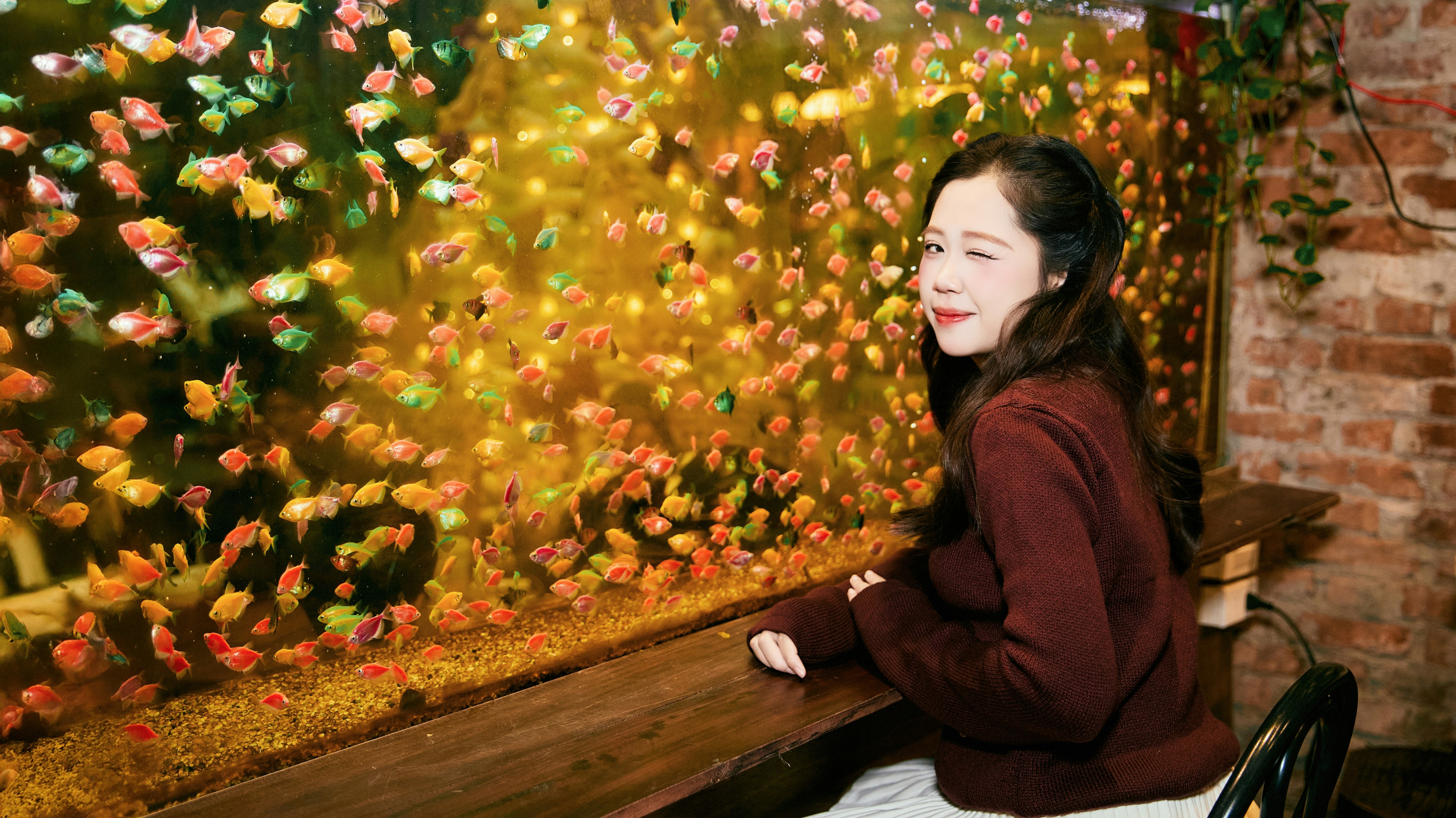 A Quiet Moment Amid a Shower of Golden Petals