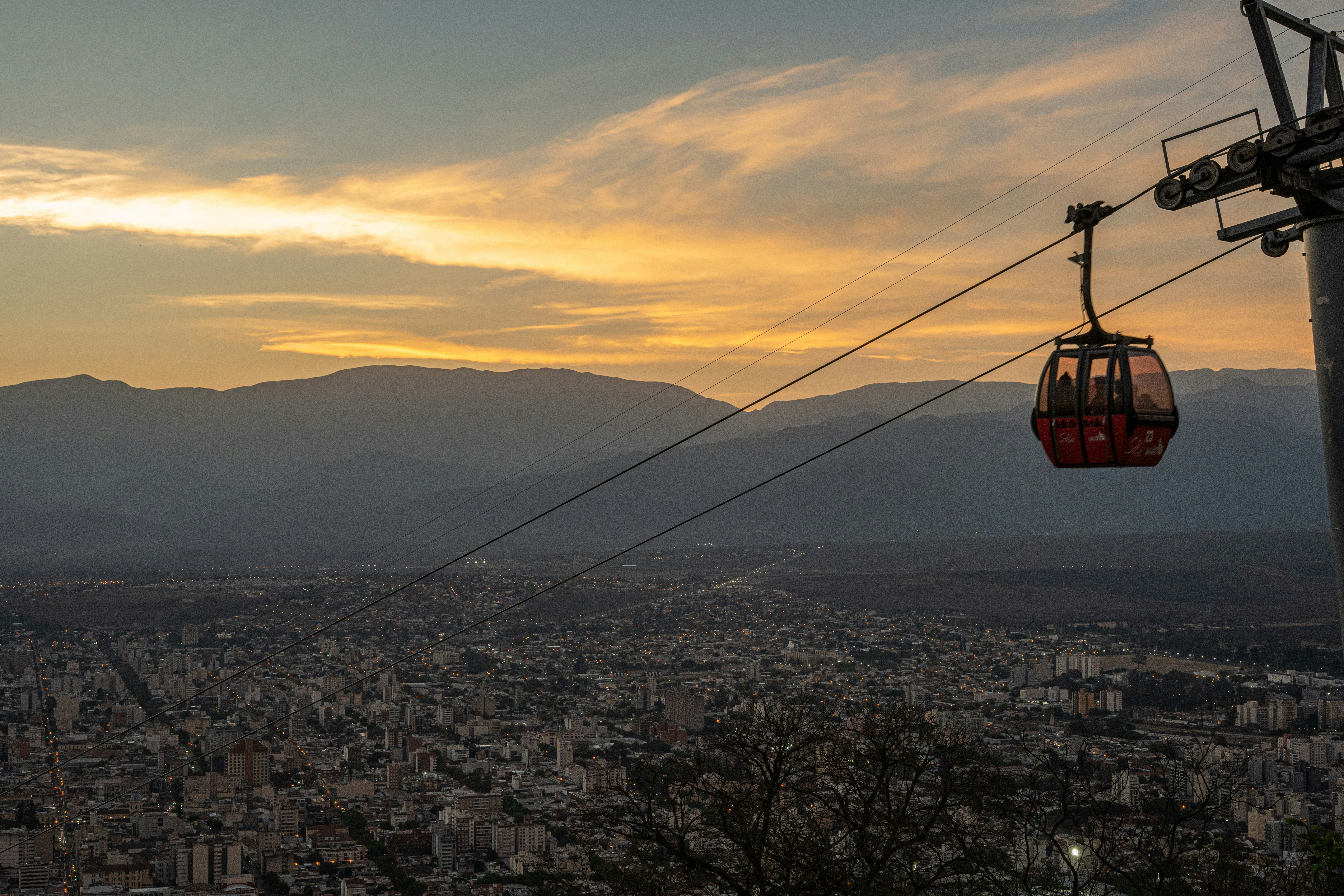 Red Gondola Against a Sunset-Soft Skyline