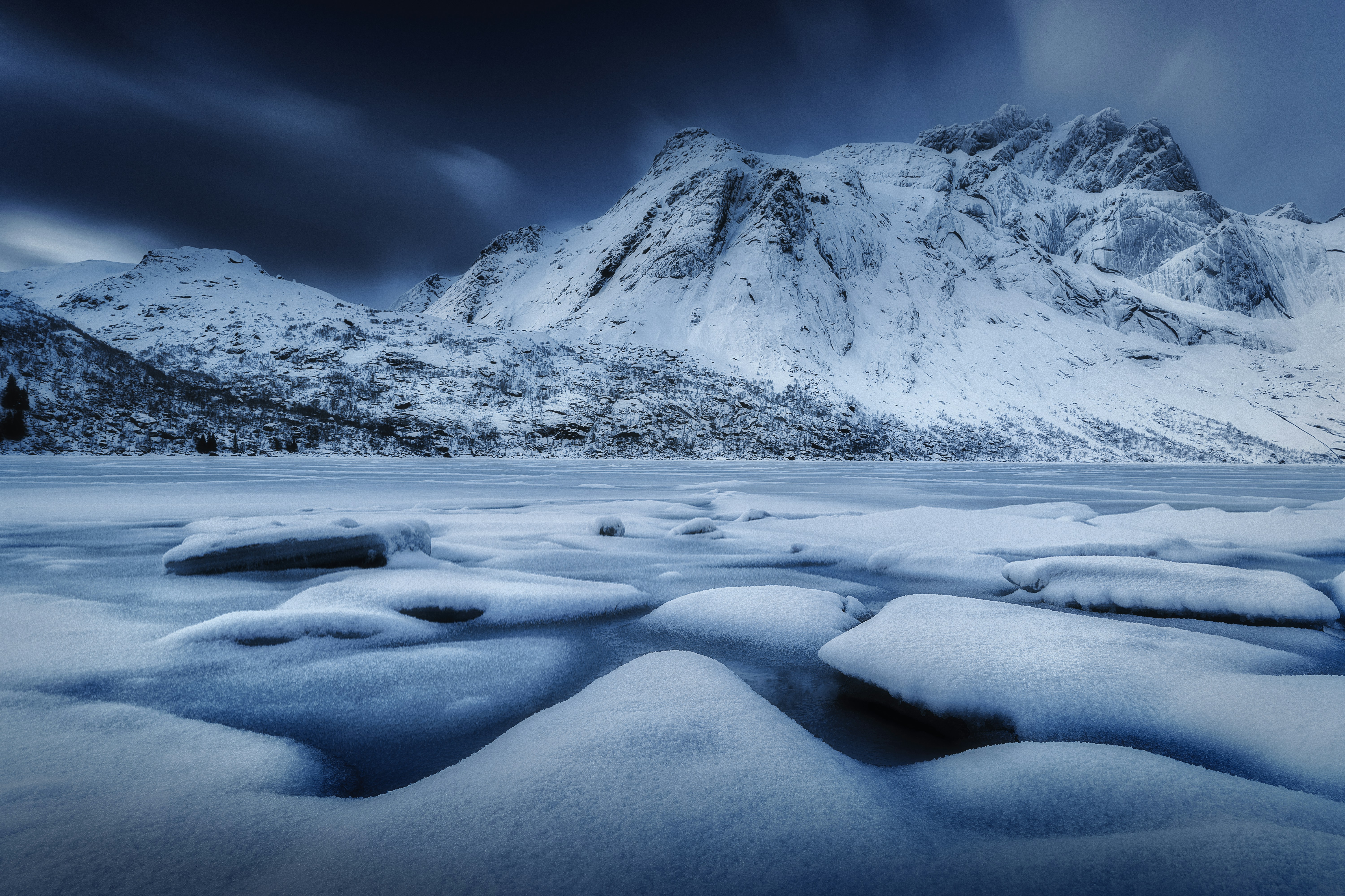 Crown of Ice Over a Blue Alpine Horizon