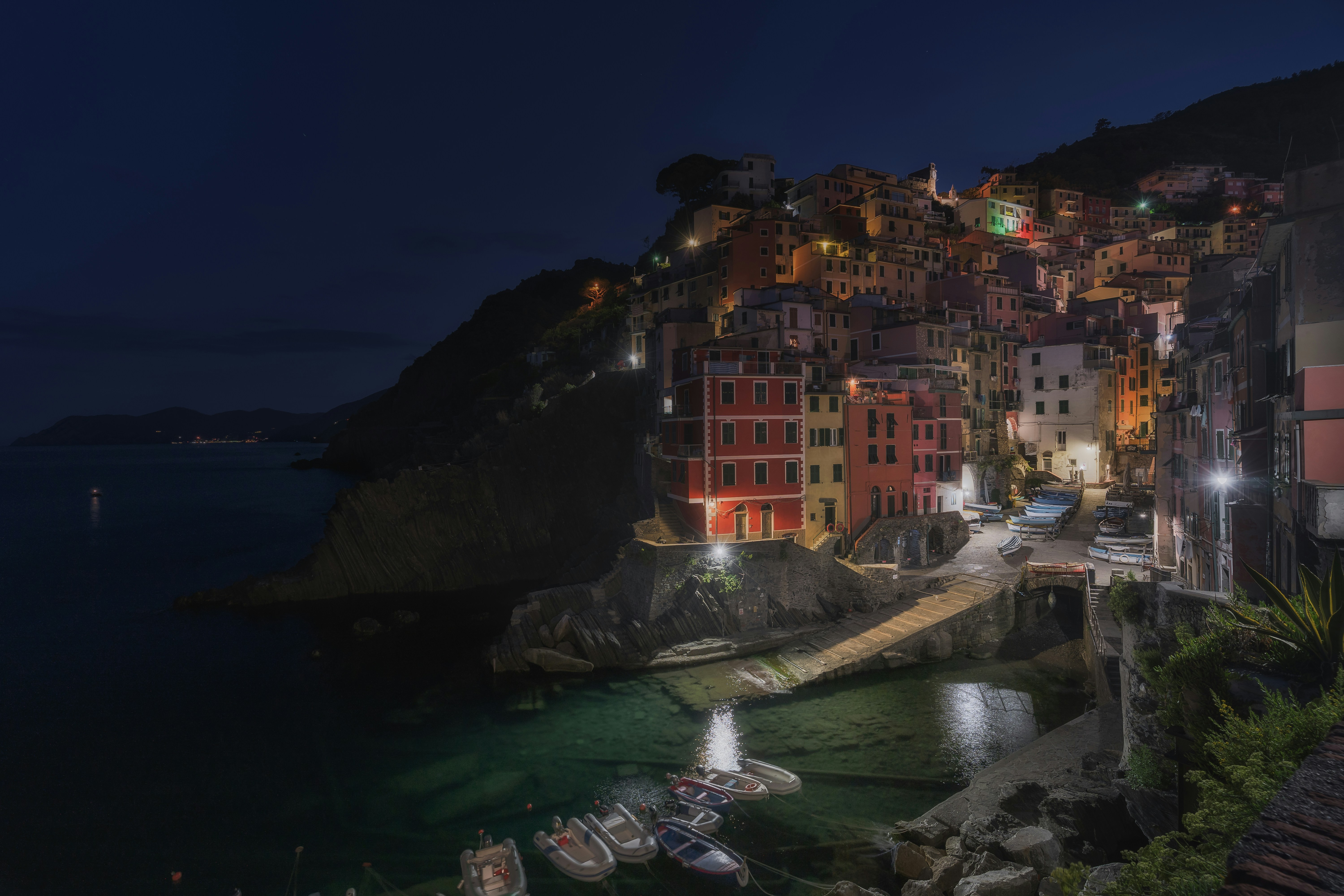 Lanterns Over the Cliffs: a Nightscape of Colorful Hilltop Village