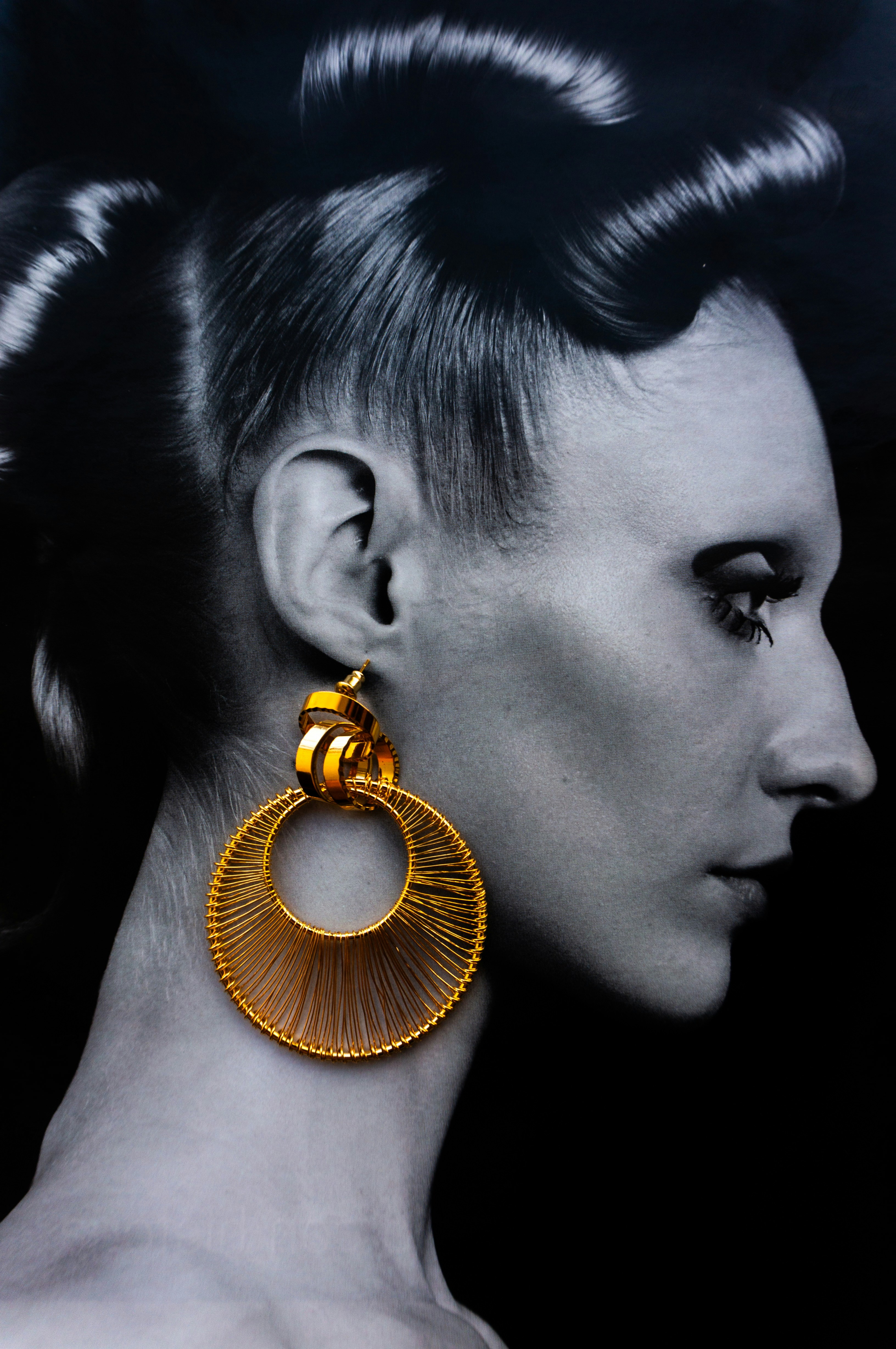 Gold Circle: A Profile of Bold Adornment