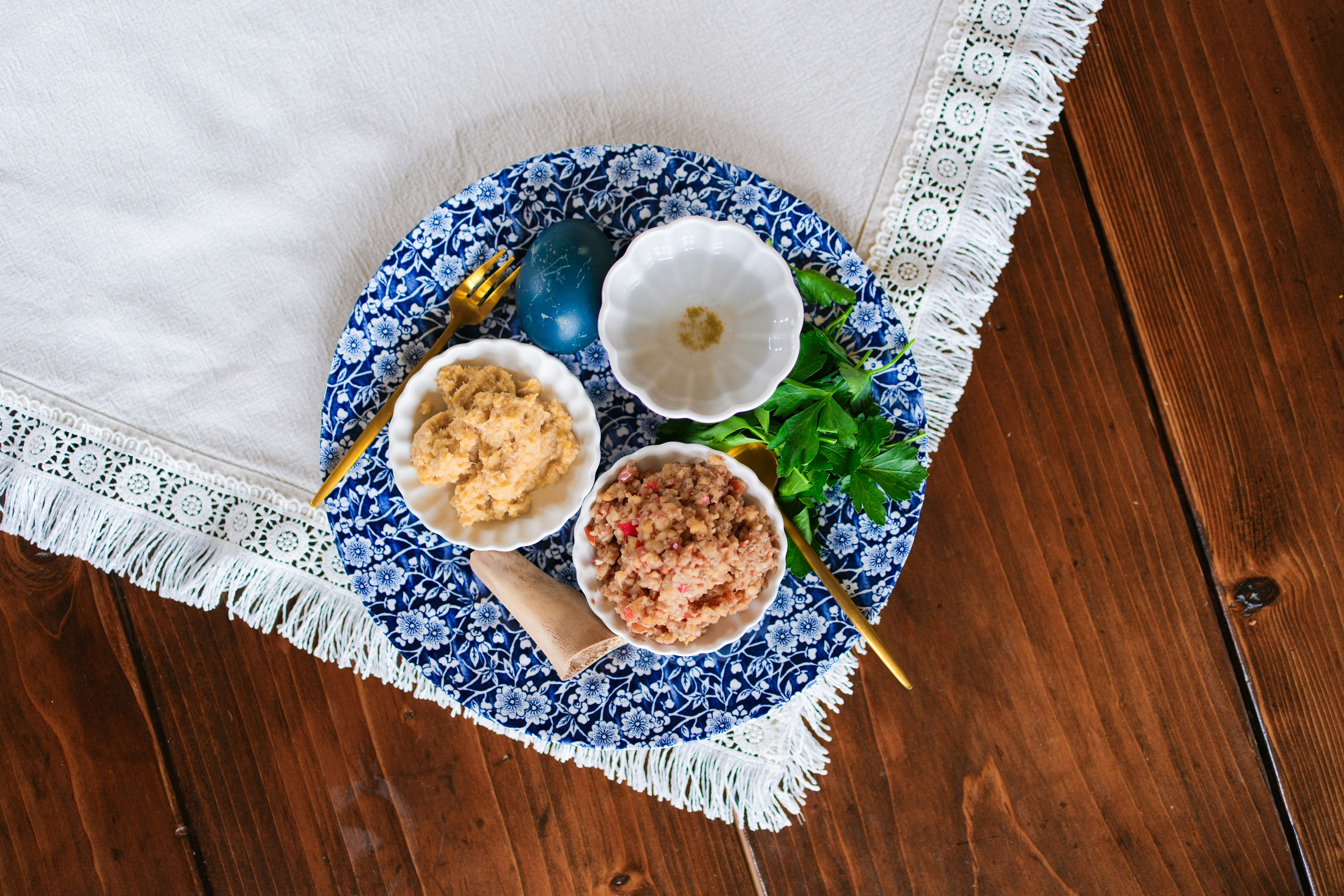 Three Crumble Bowls on a Blue Floral Plate, a Top-Down Still Life