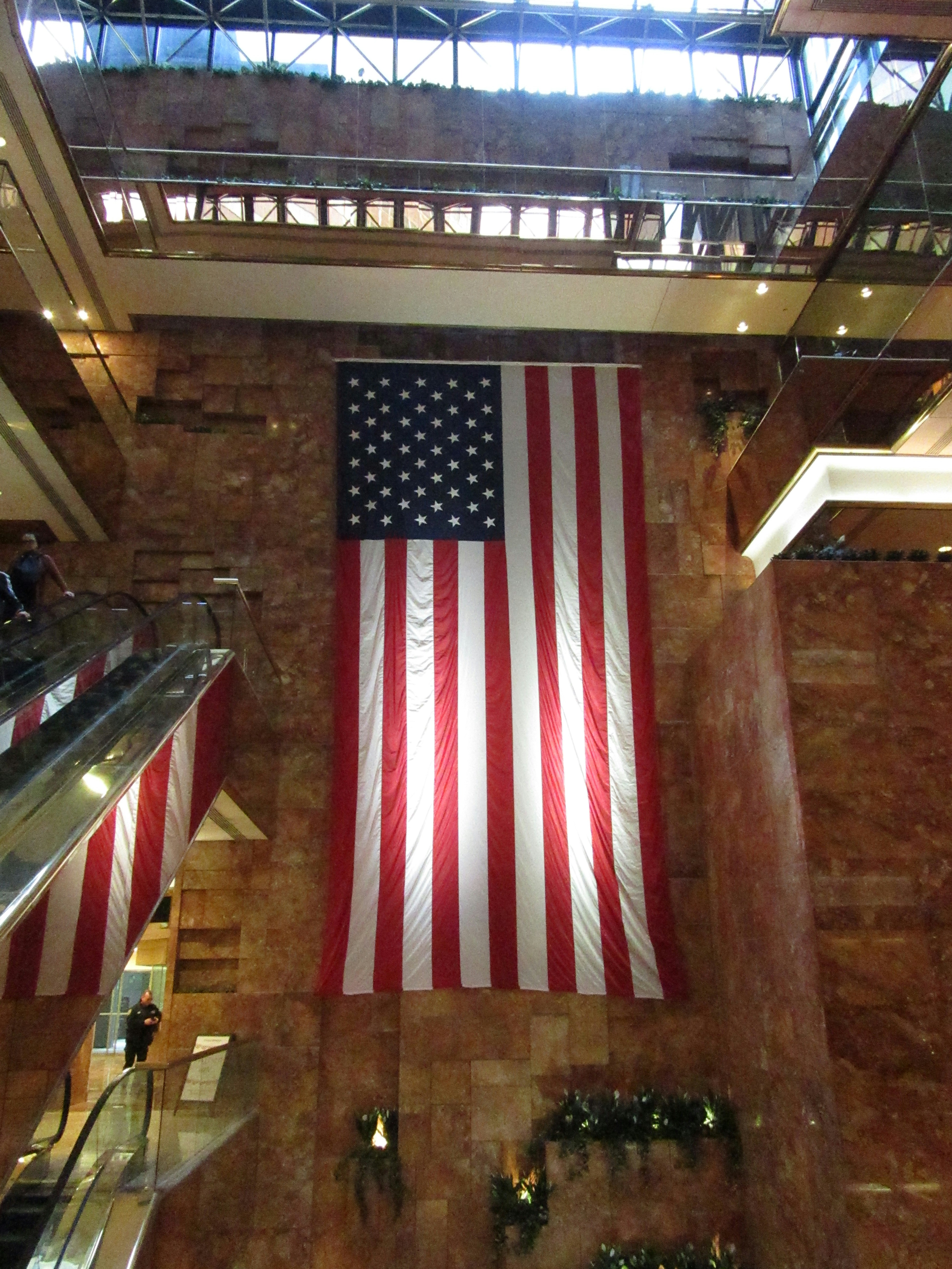 The giant flag that hangs inside the Trump Tower