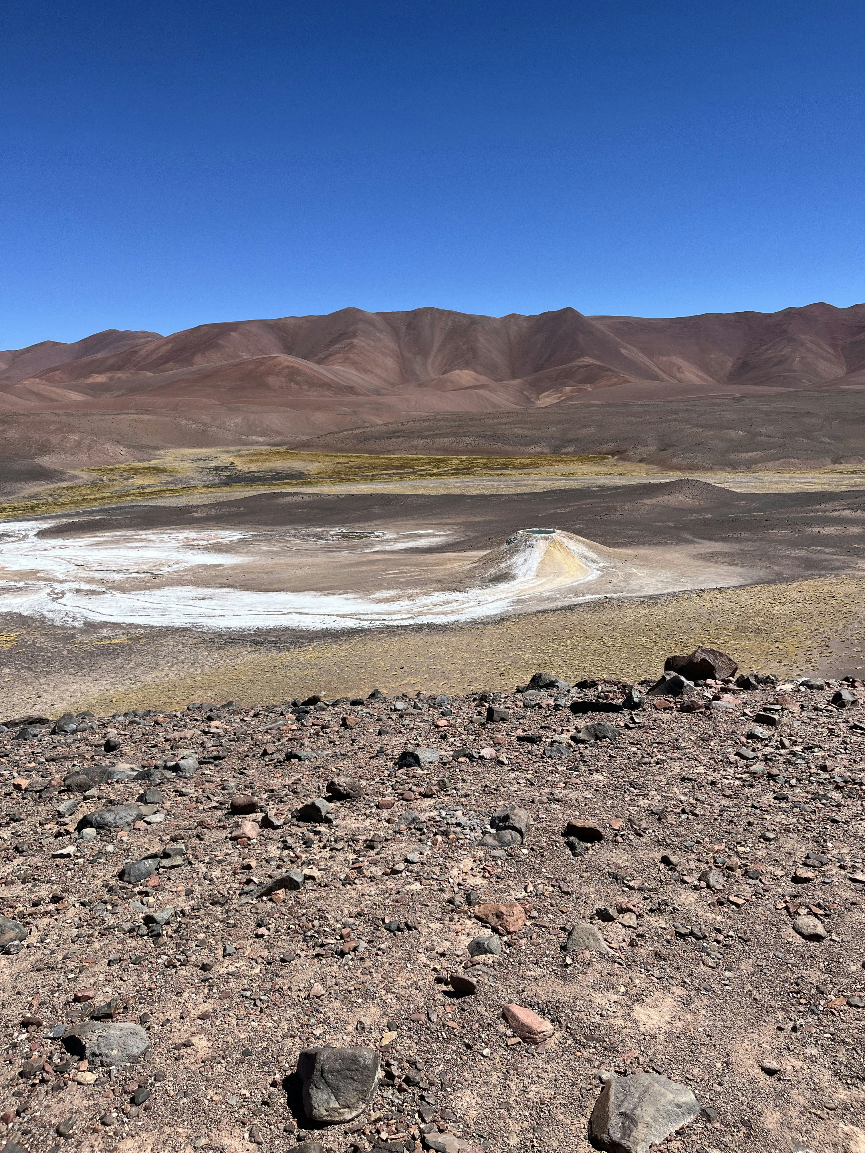 Salt Cone in a Desert Valley Under a Cerulean Sky