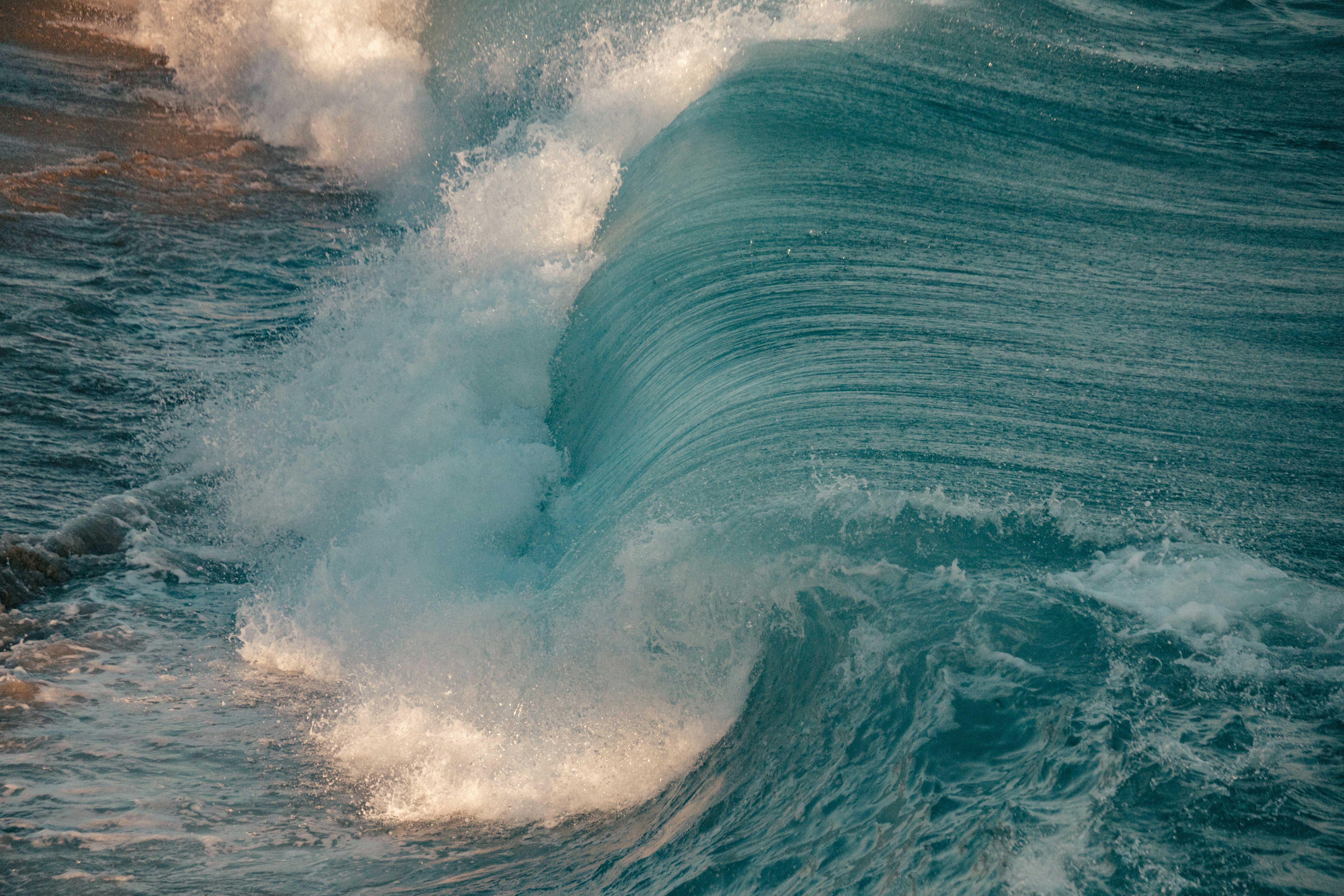 Turquoise Curl: The Glassy Barrel of a Breaking Wave