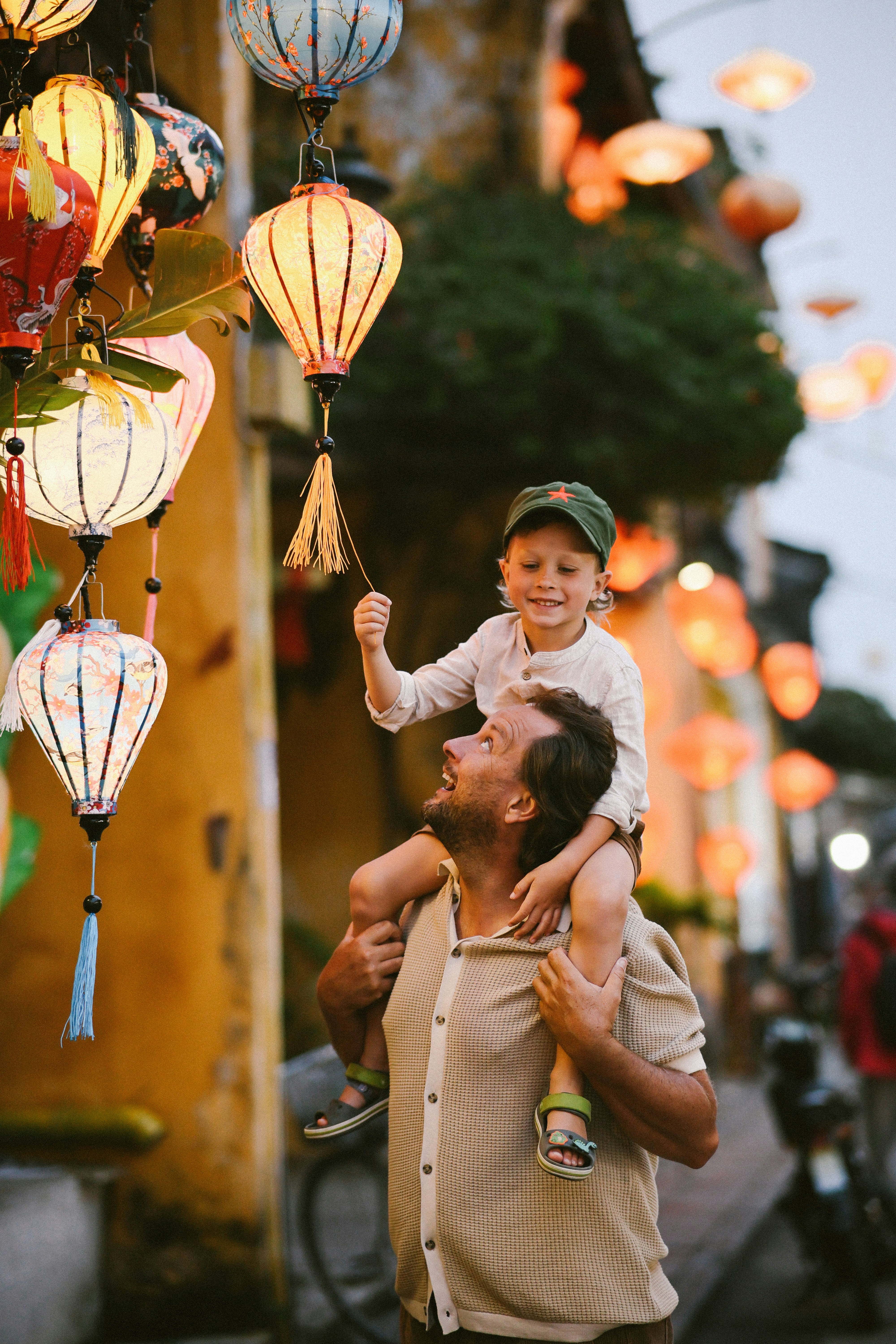 Shouldering Joy Beneath a Lantern Sky