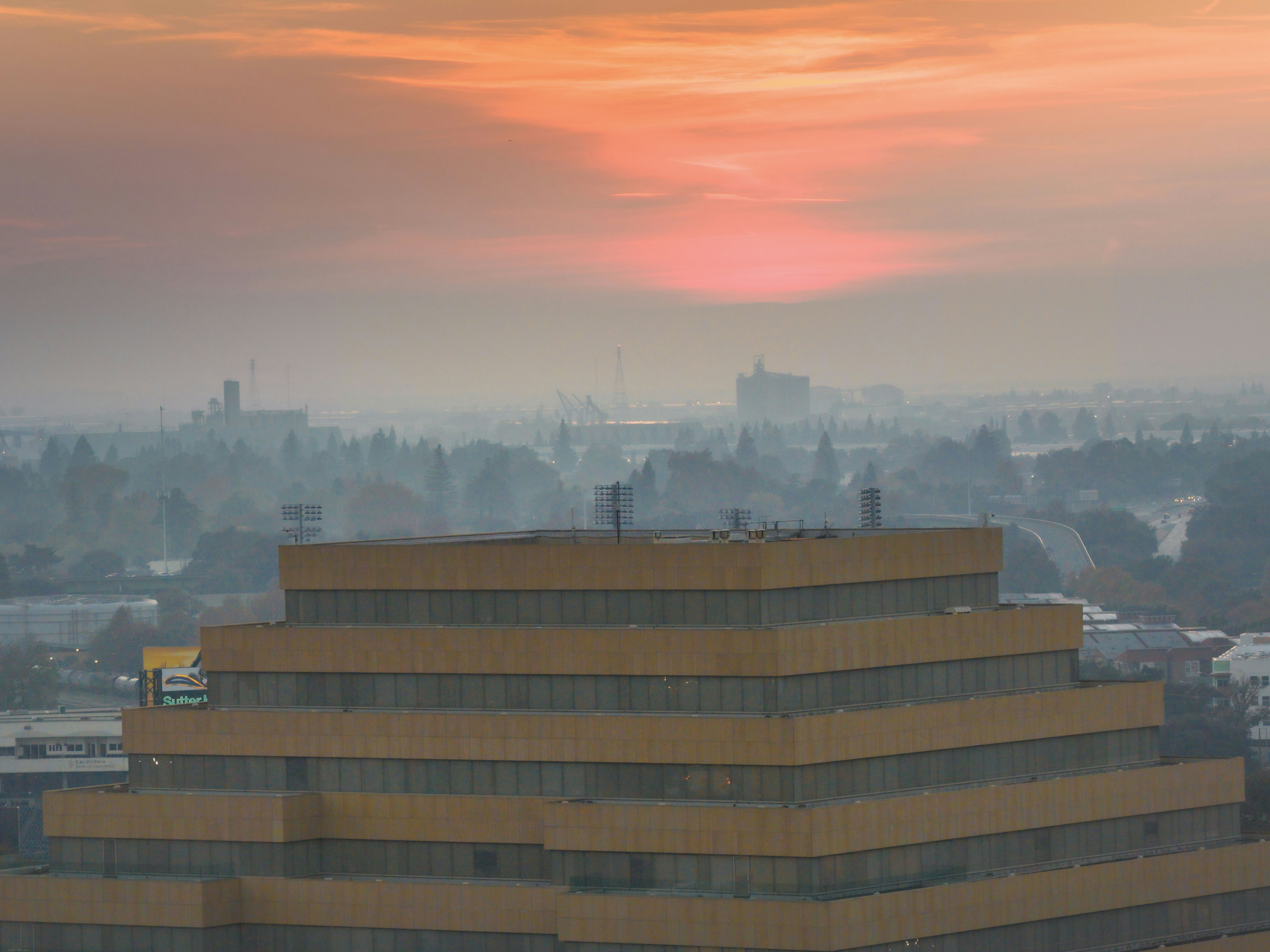 Terraced Sunset Over a Tiered City Block