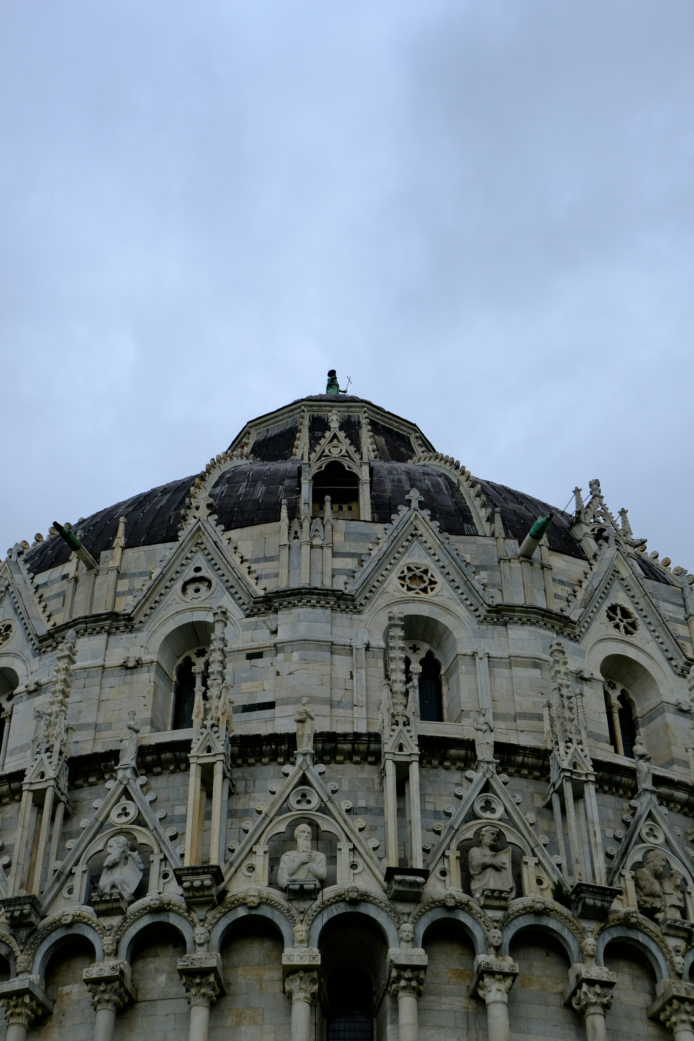 Ornate Cathedral Facade Reaching Toward a Gloomy Sky