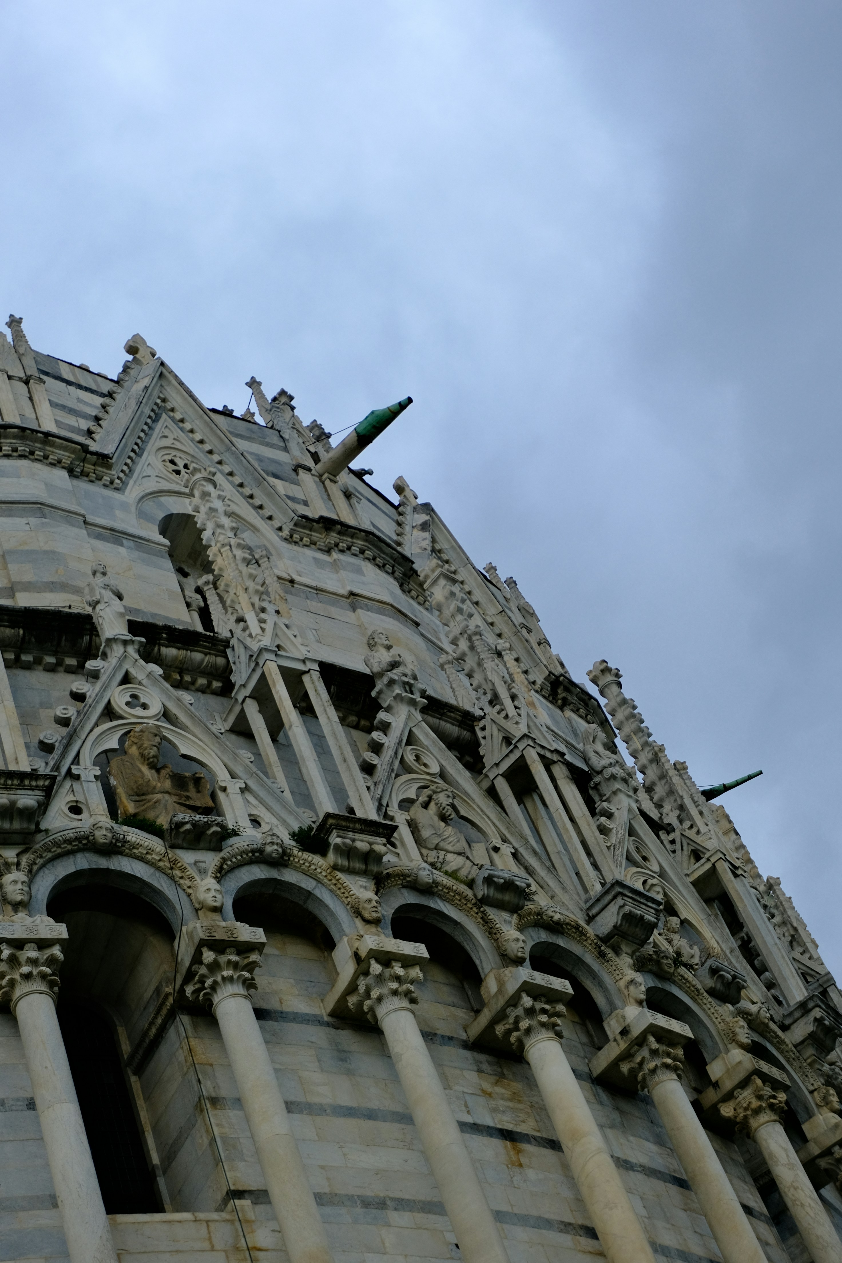 Stone Arches: Sculpted Figures Crown a Gothic Cathedral Facade