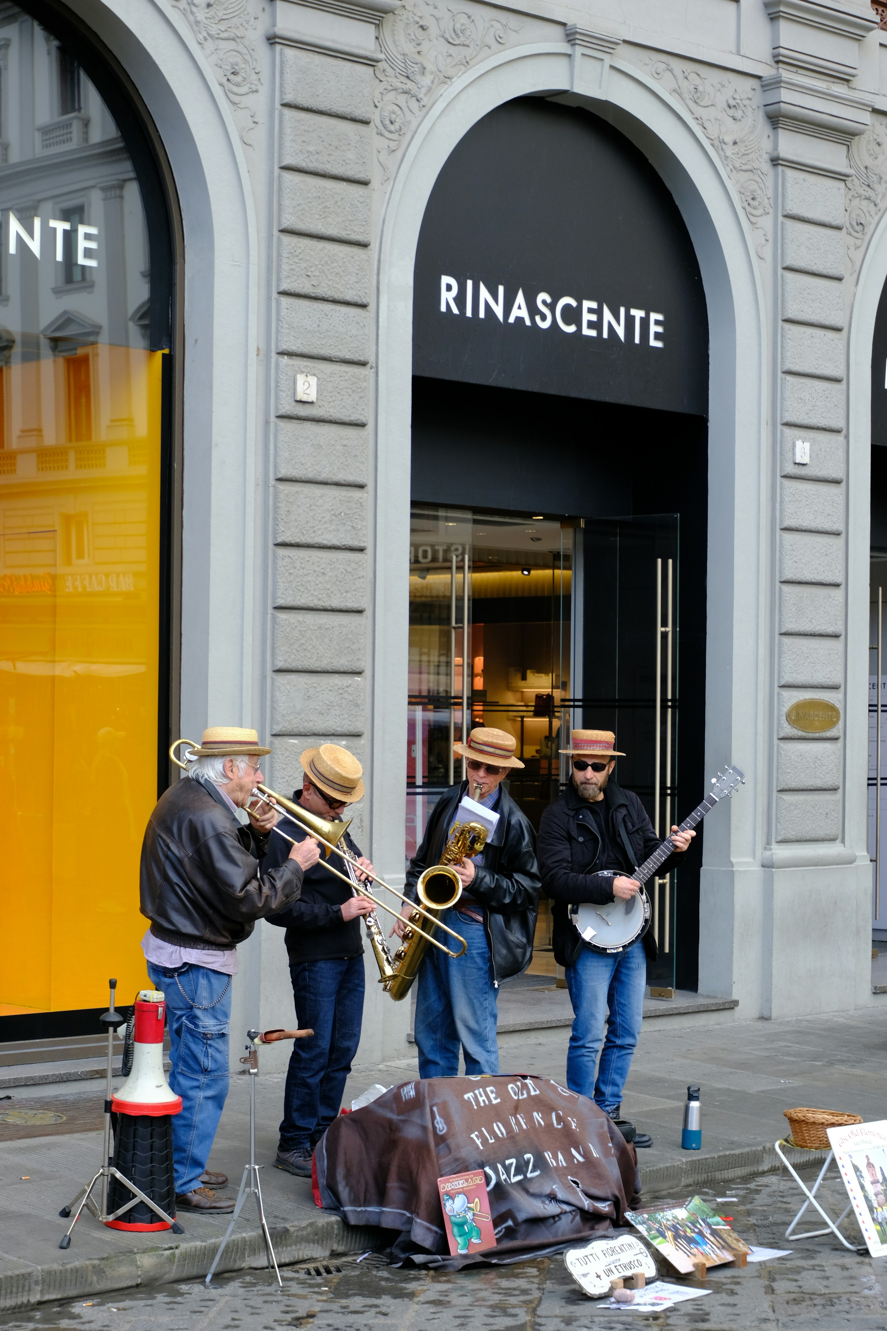 Jazz on the cobbles: street quartet under Florence storefronts