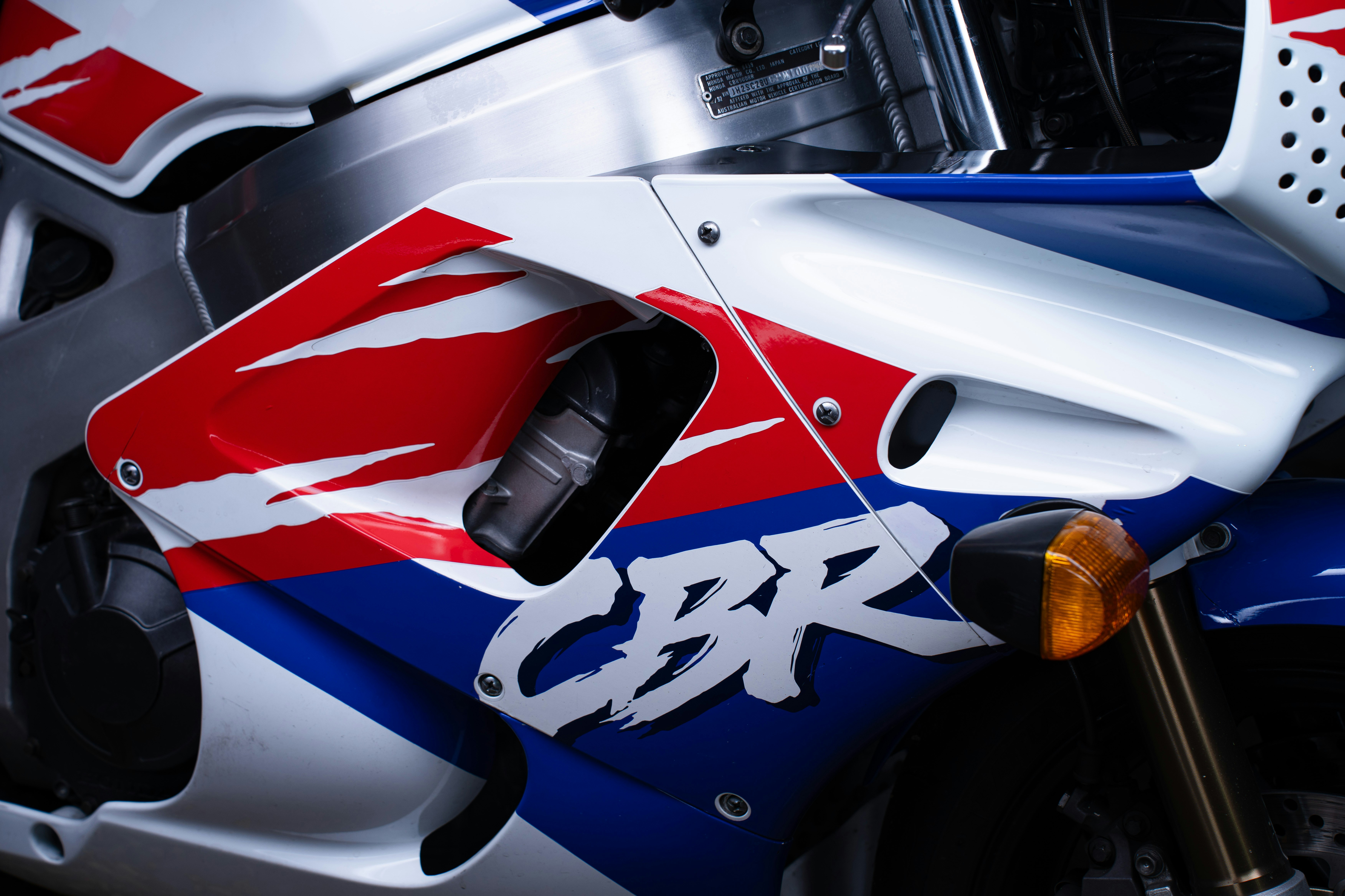 Chromed Velocity: Close-Up of a Racing Moto's Graphic Panel