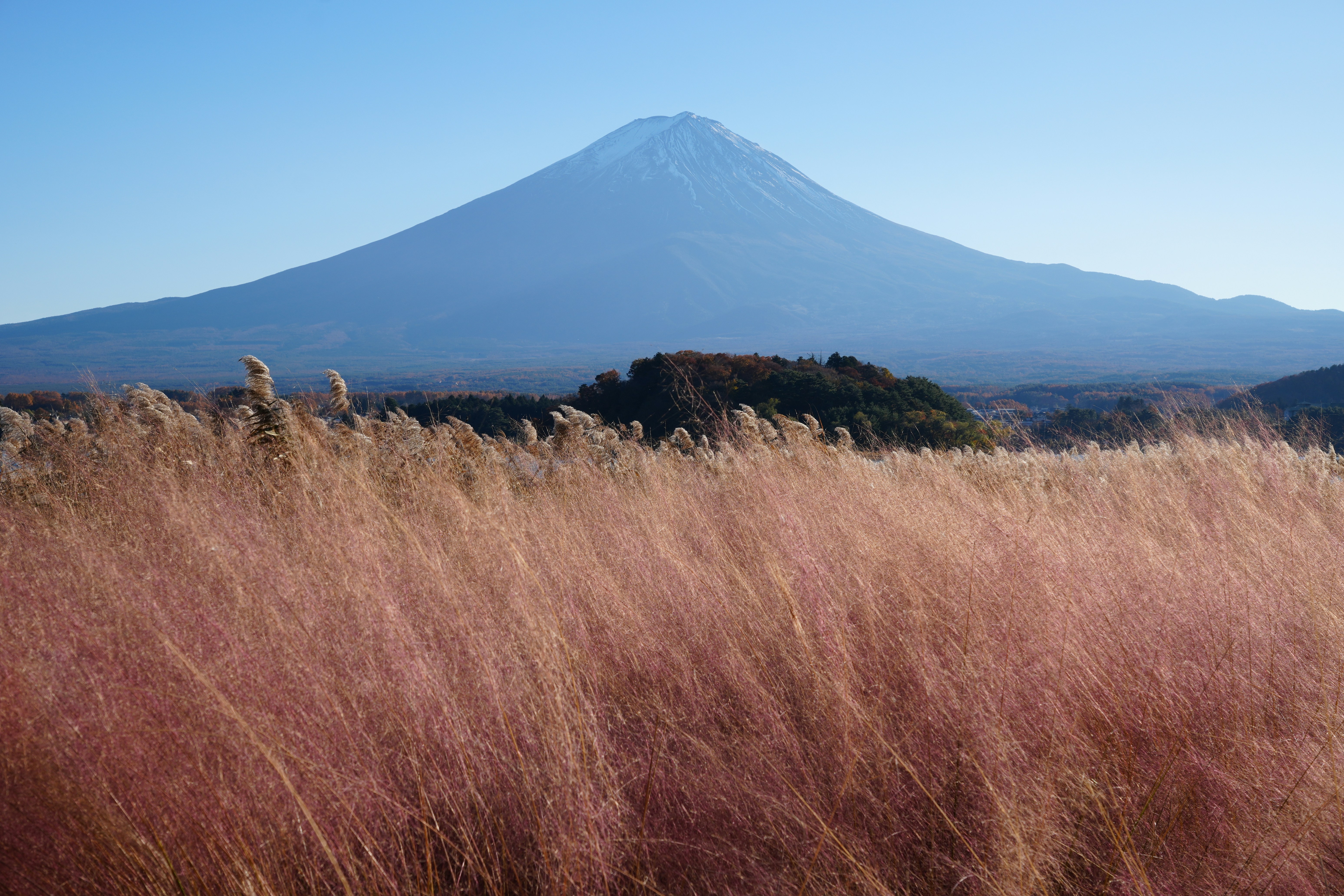 Mount Fuji, the highest and most iconic mountain in Japan. It is an active volcano located on the island of Honshu, about 60 miles (100 km) west of the Tokyo-Yokohama metropolitan area.
