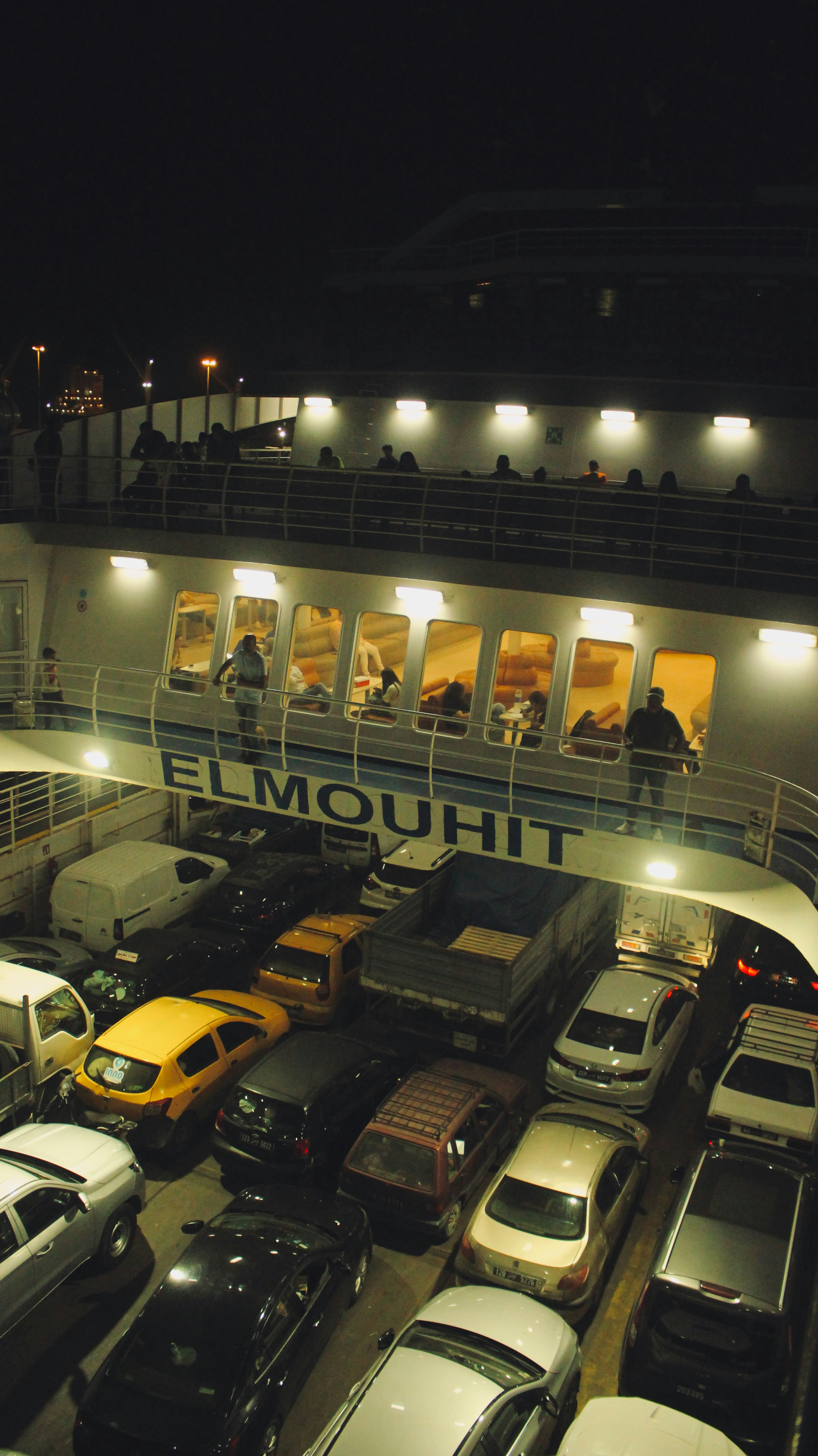 Night Crossing: ElMOUHIT Deck Illuminates a City Car Park