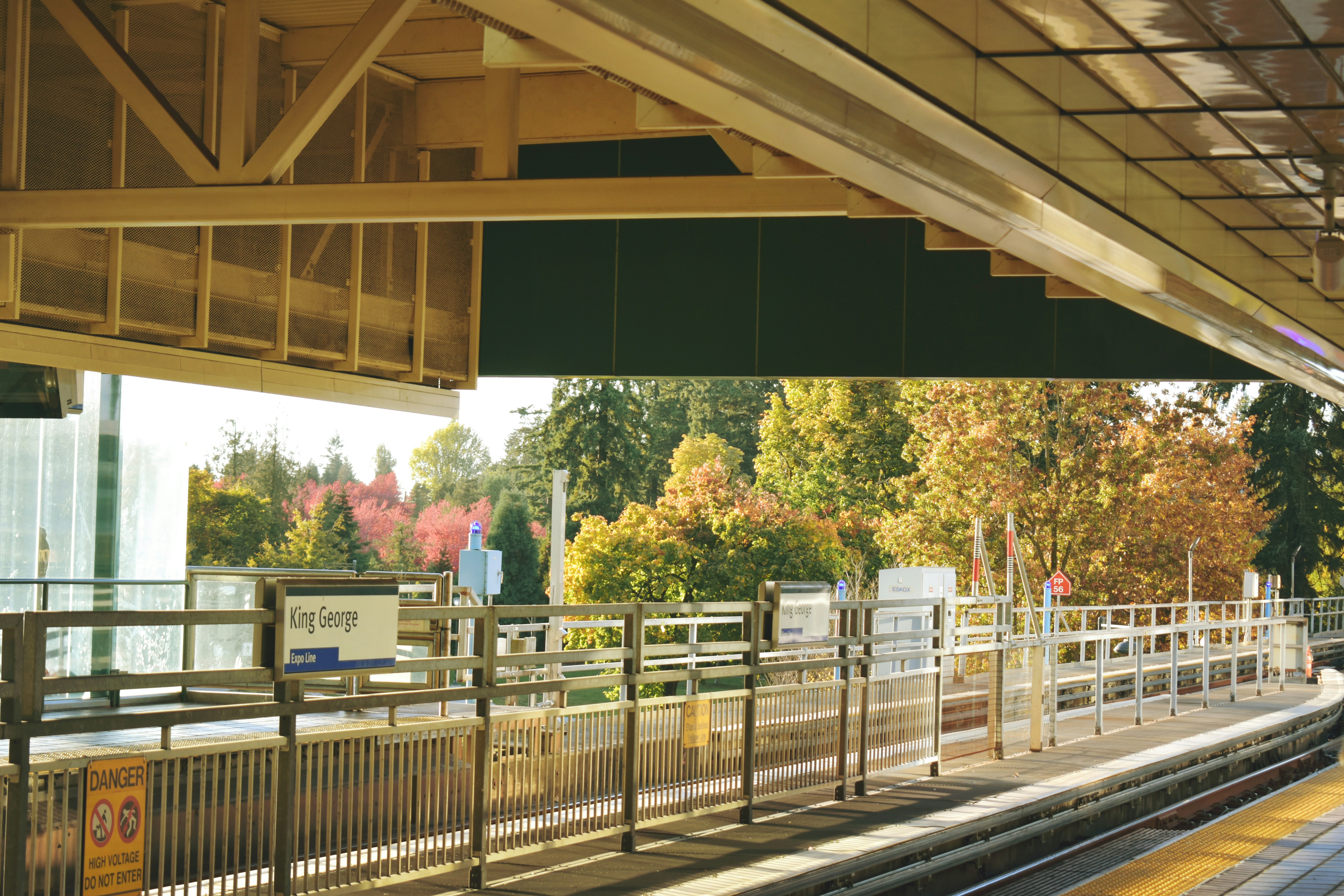 Train station with autumn trees in background photo – Free Travel Image ...