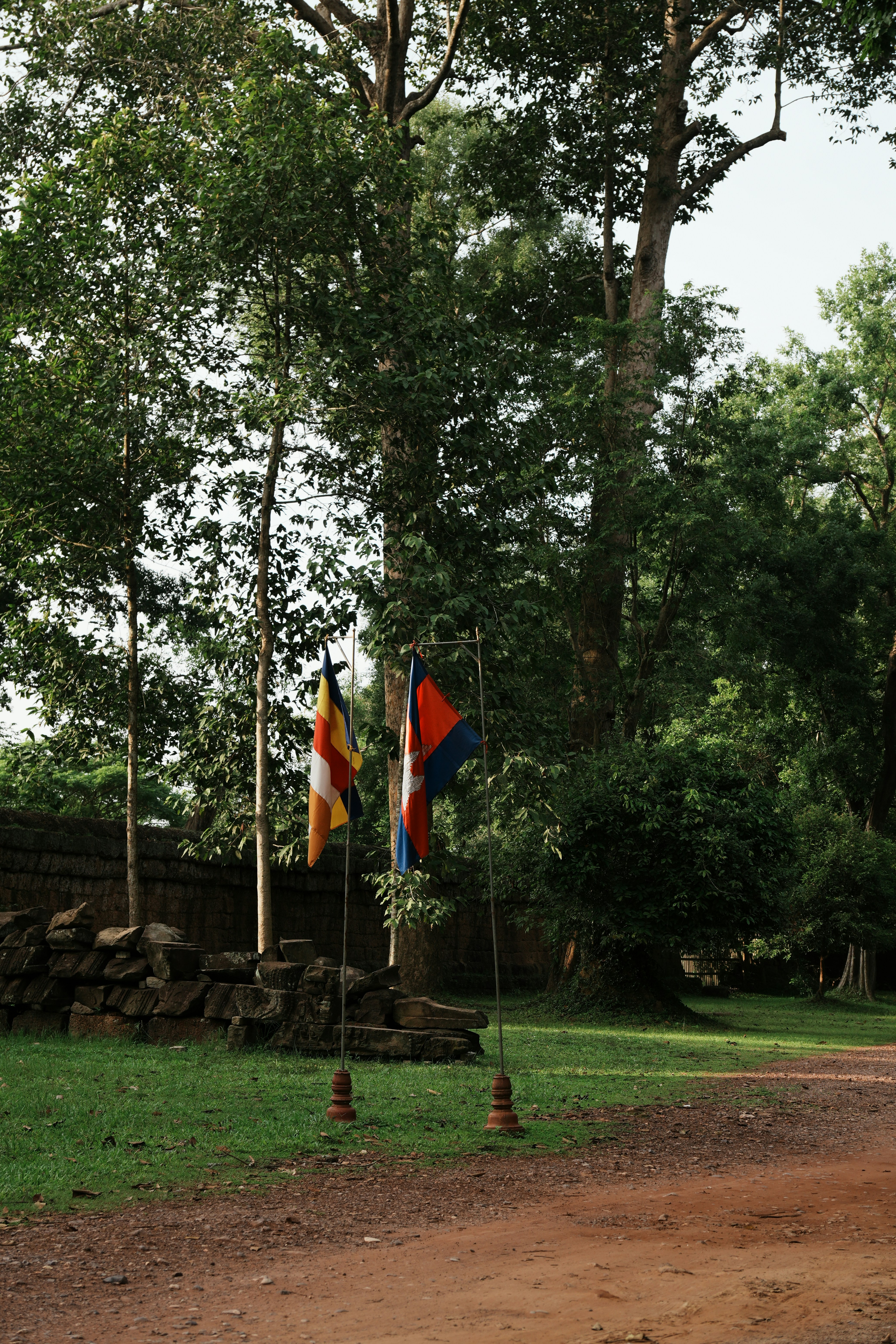 Flagpoles in a Quiet Garden of Stones