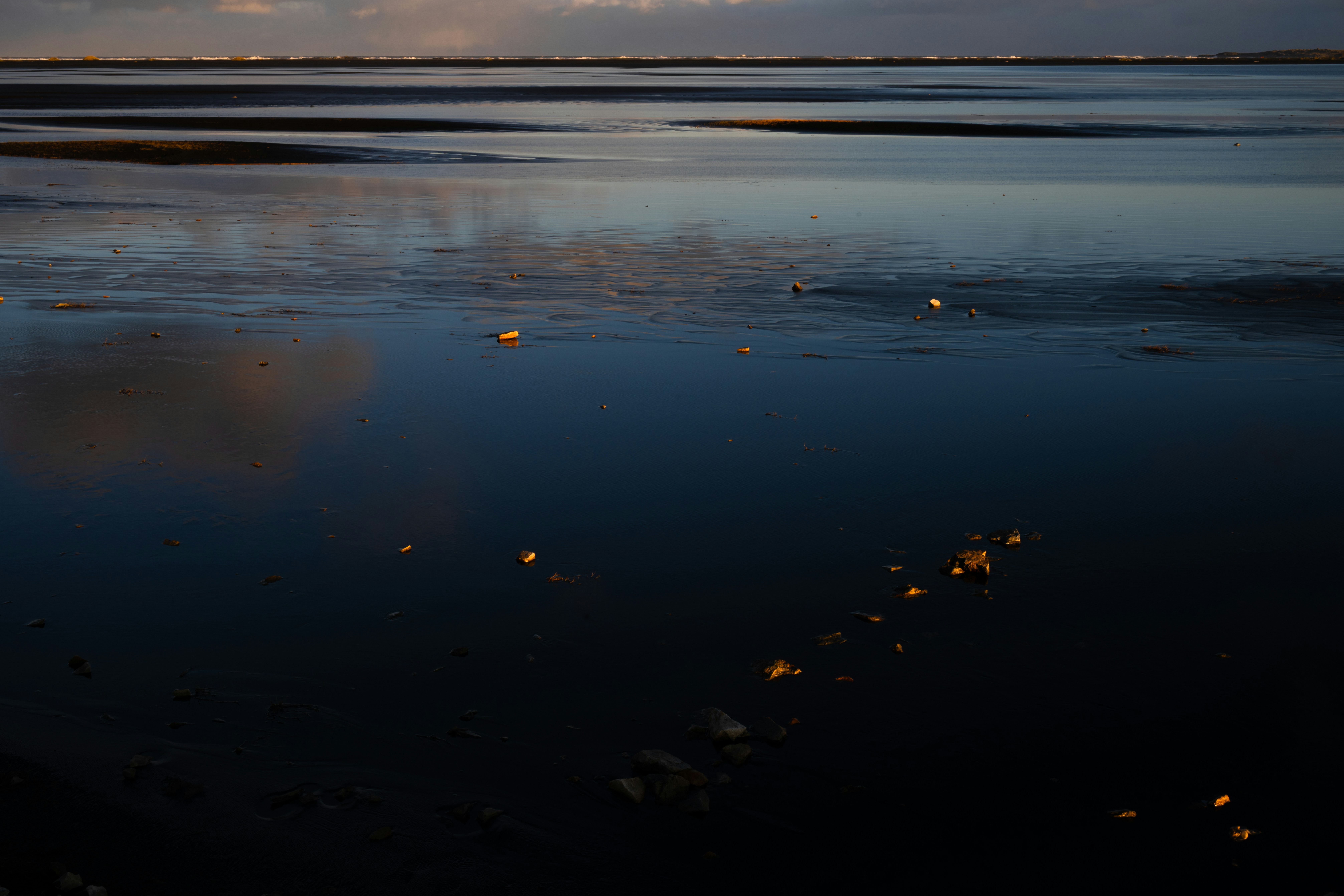 Glassy Shoreline at Sunset
