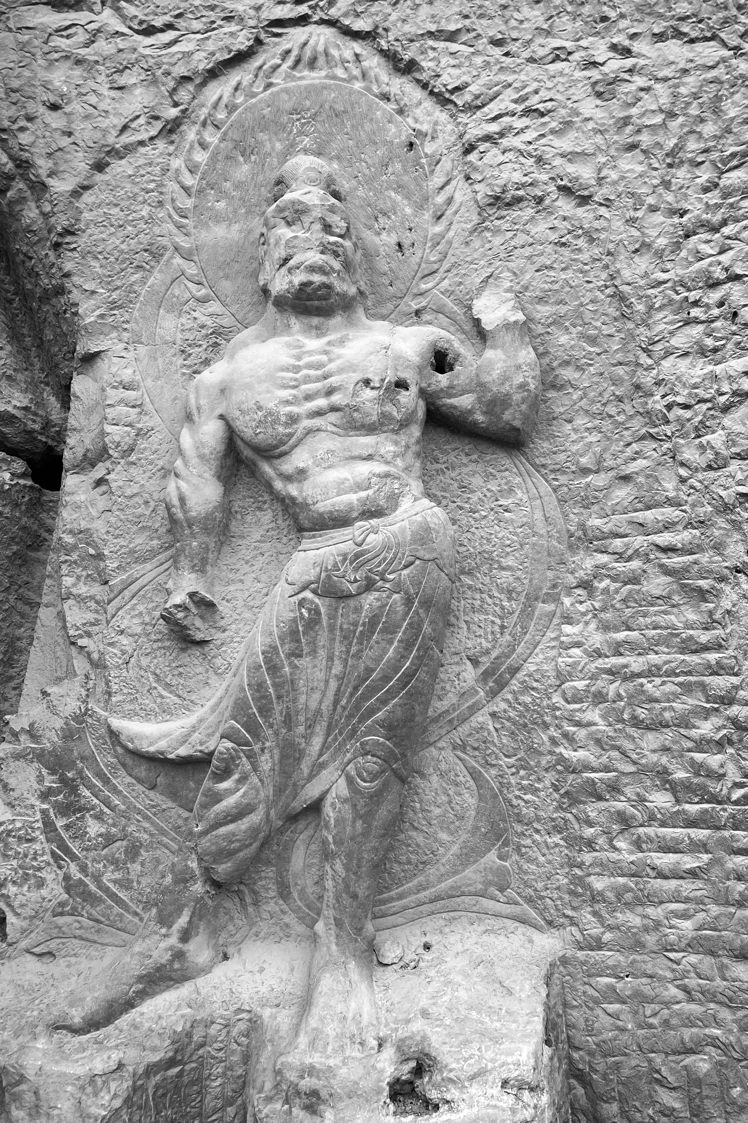 Ancient Stone Warrior Emerges from the Wall