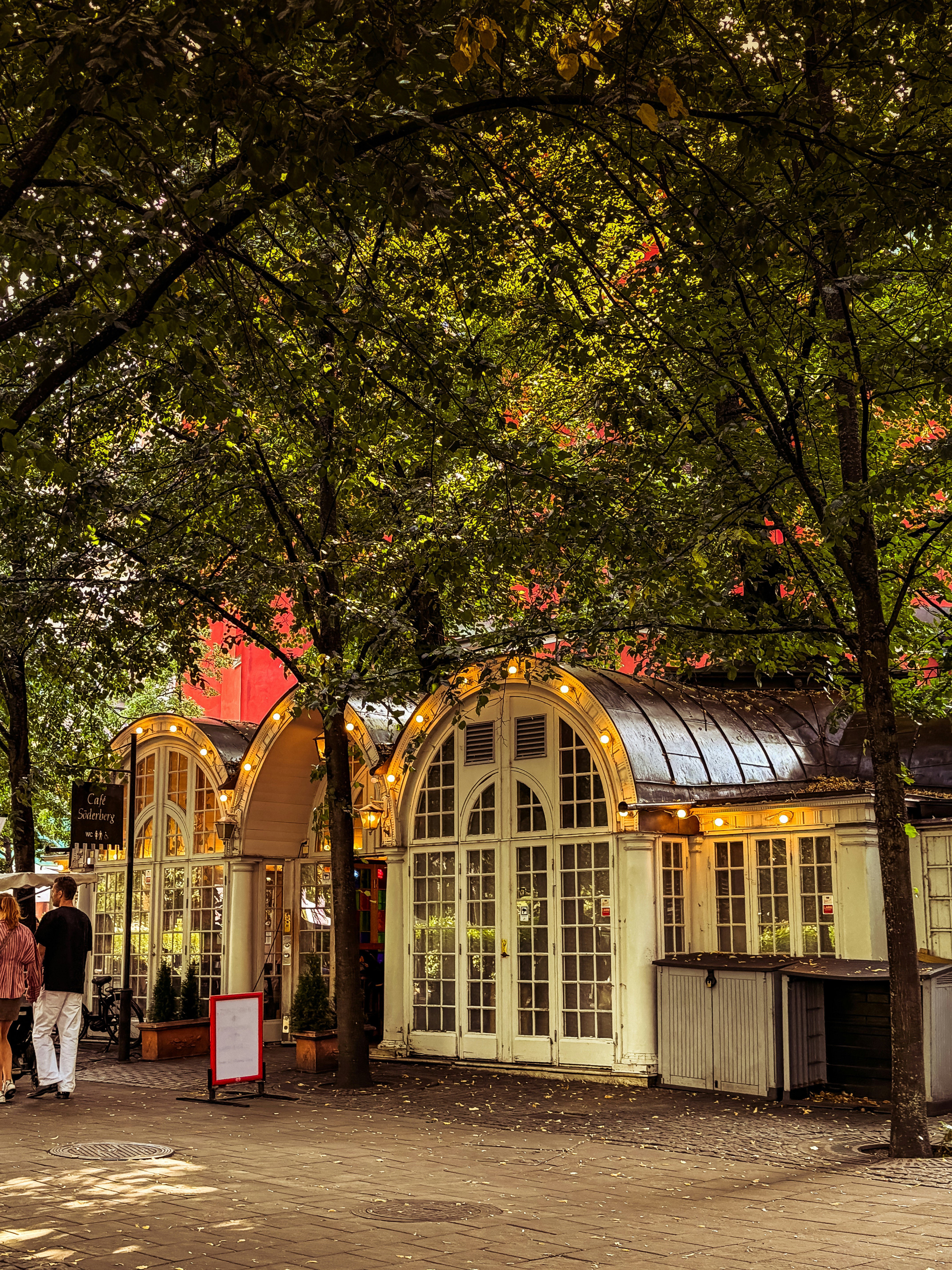 Candlelit Conservatories at Dusk Courtyard