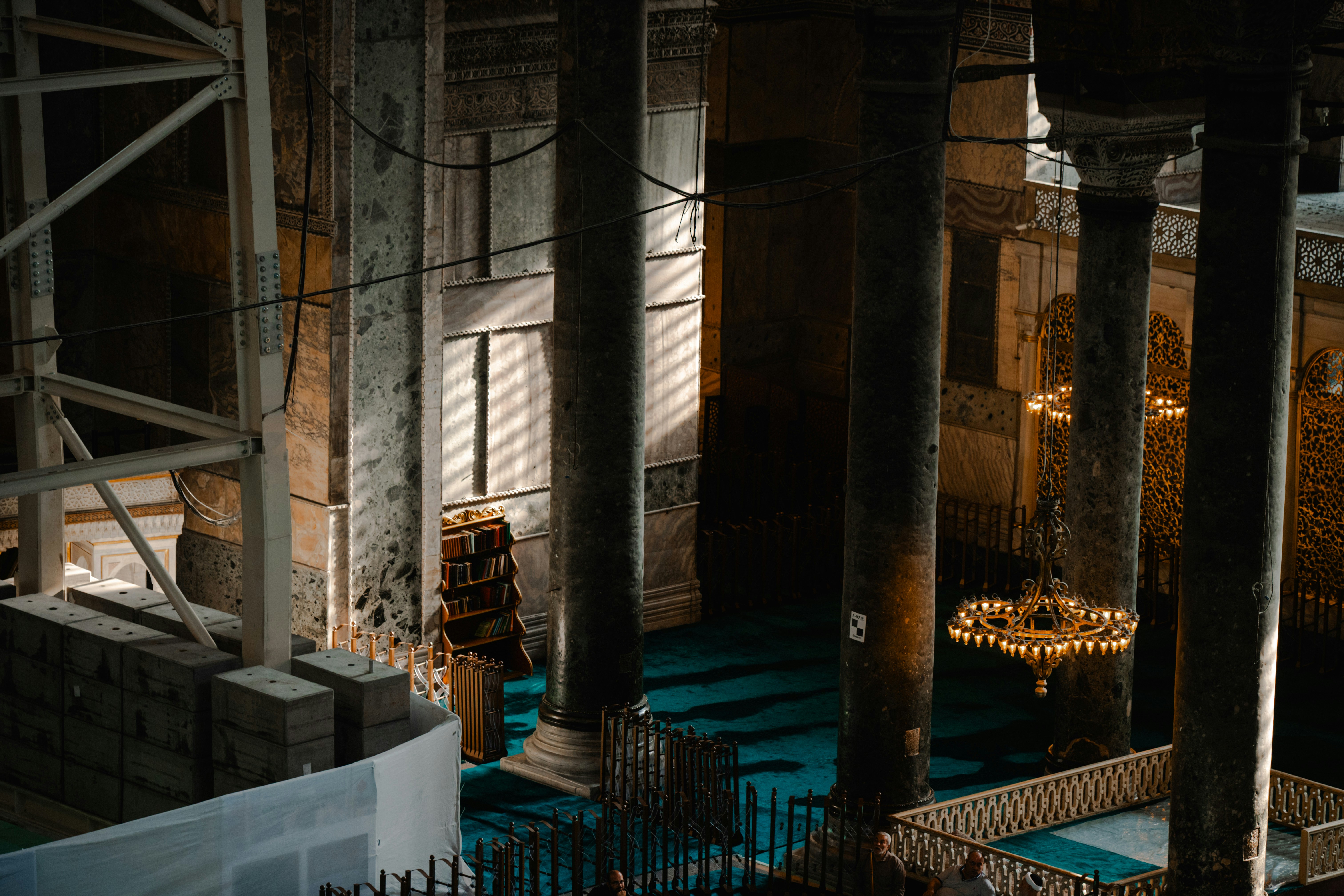 Amber Veil: Sunlit Columns and Chandeliers in a Sacred Hall