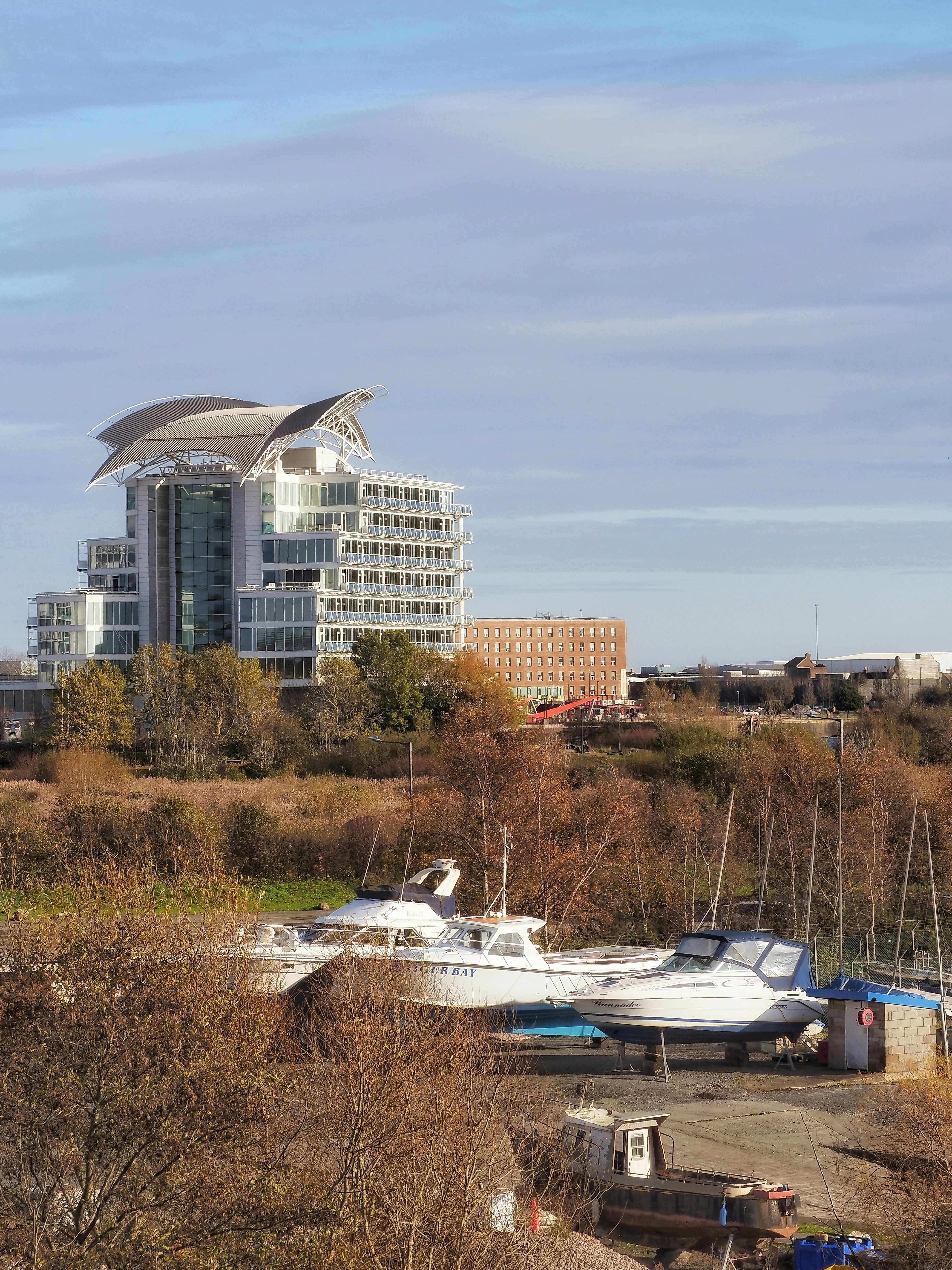 Harbor Edge: The Modern Archipelago Rising Over Boats