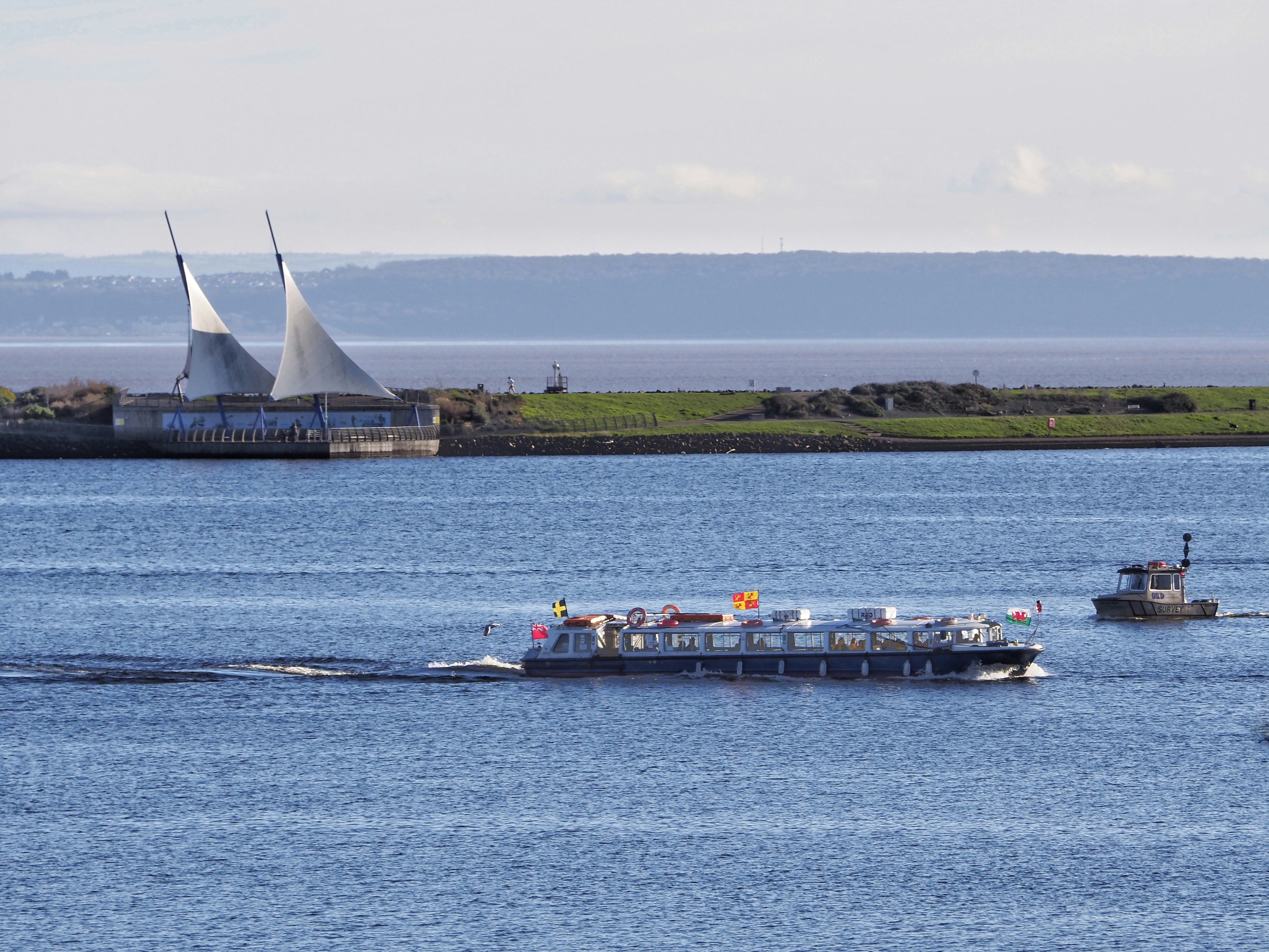 Boats Patrolling the Calm Blue Bay