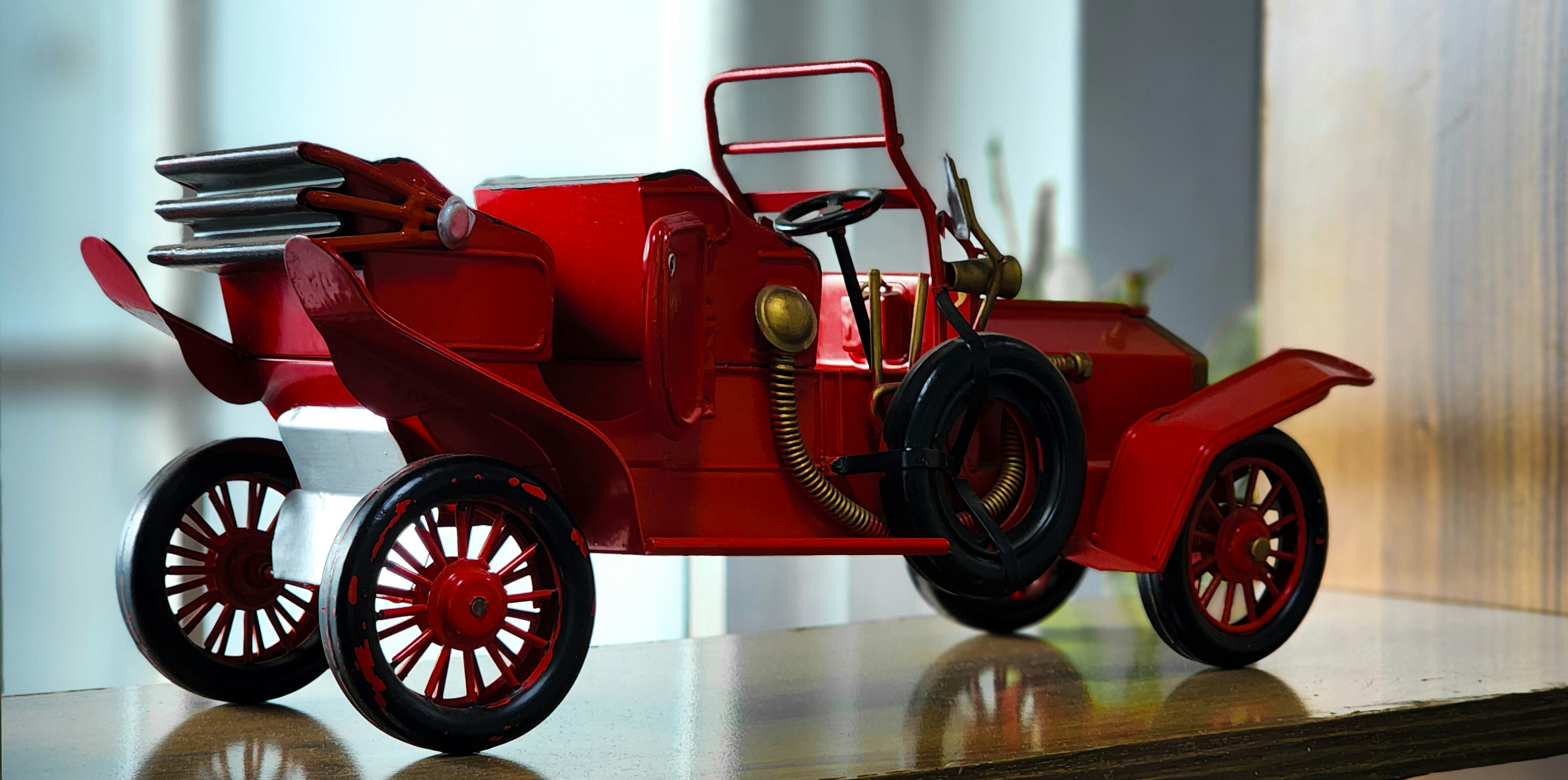 Red Timekeeper: A Vintage Toy Car Reimagined