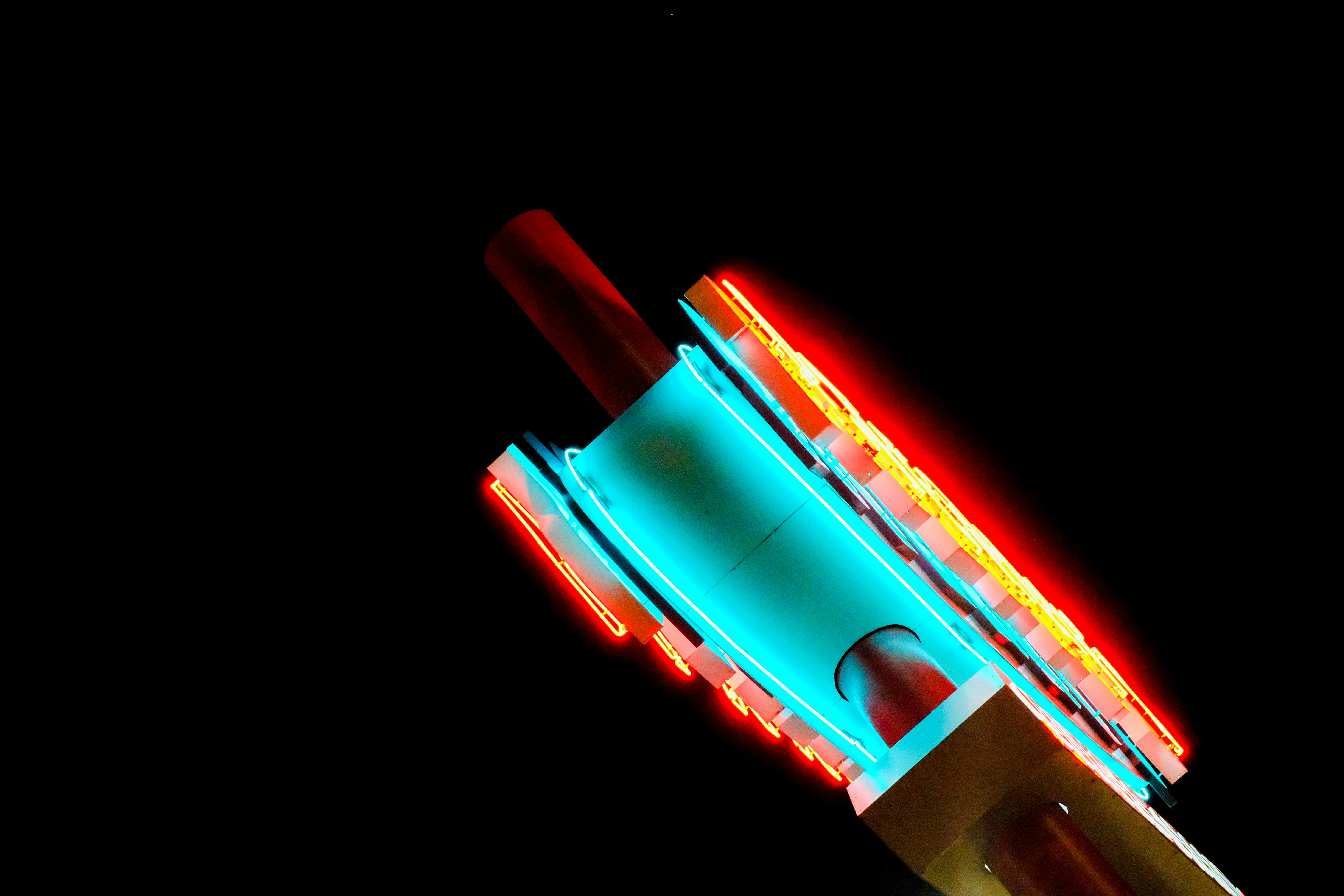 Neon Lipstick: a tilted glow of electric blue and crimson