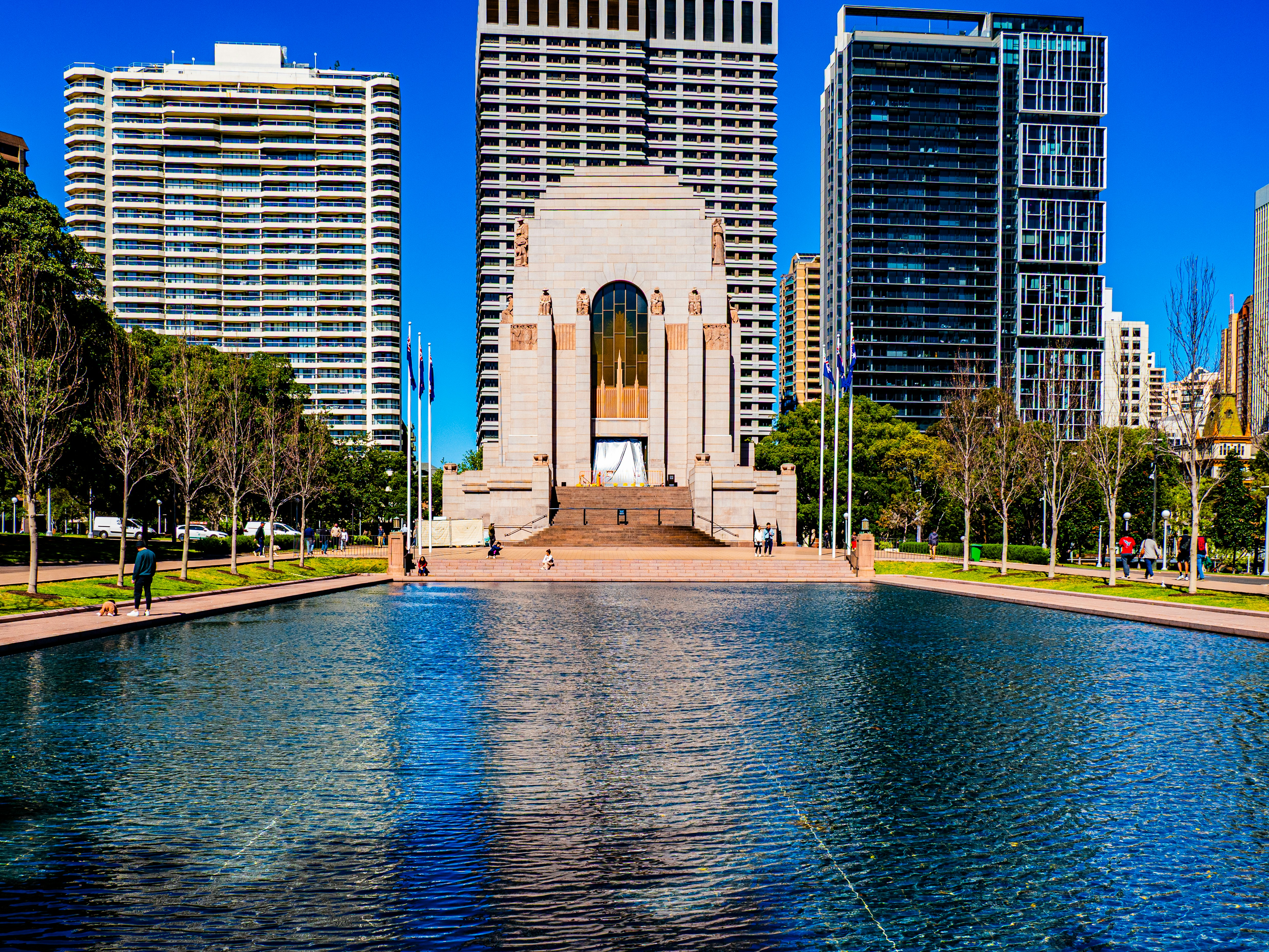 The Monumental Pool: Granite Archway Framed by Skyscrapers
