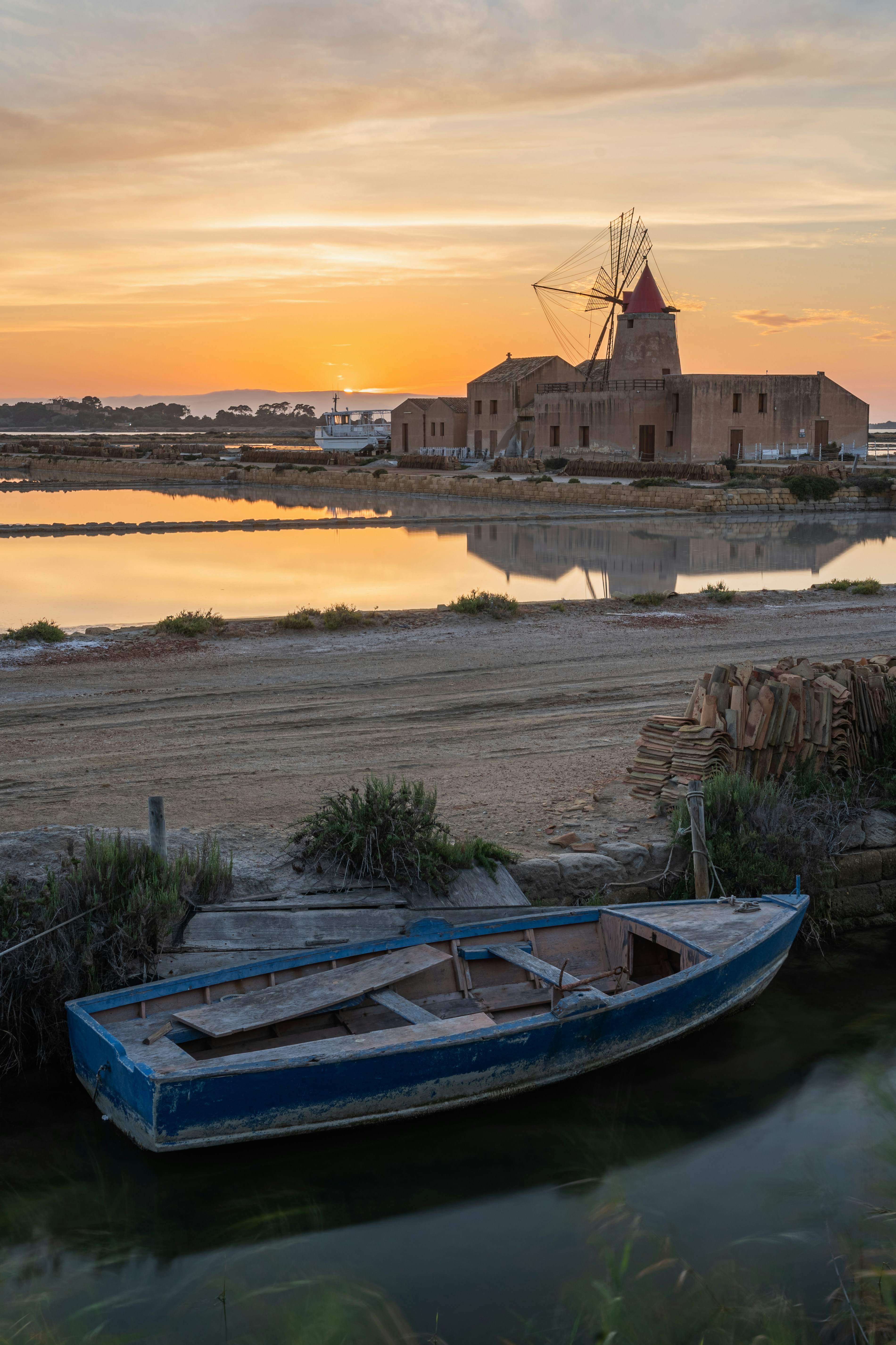 Salt-Washed Fortress at Sunset with Boat in the Foreground
