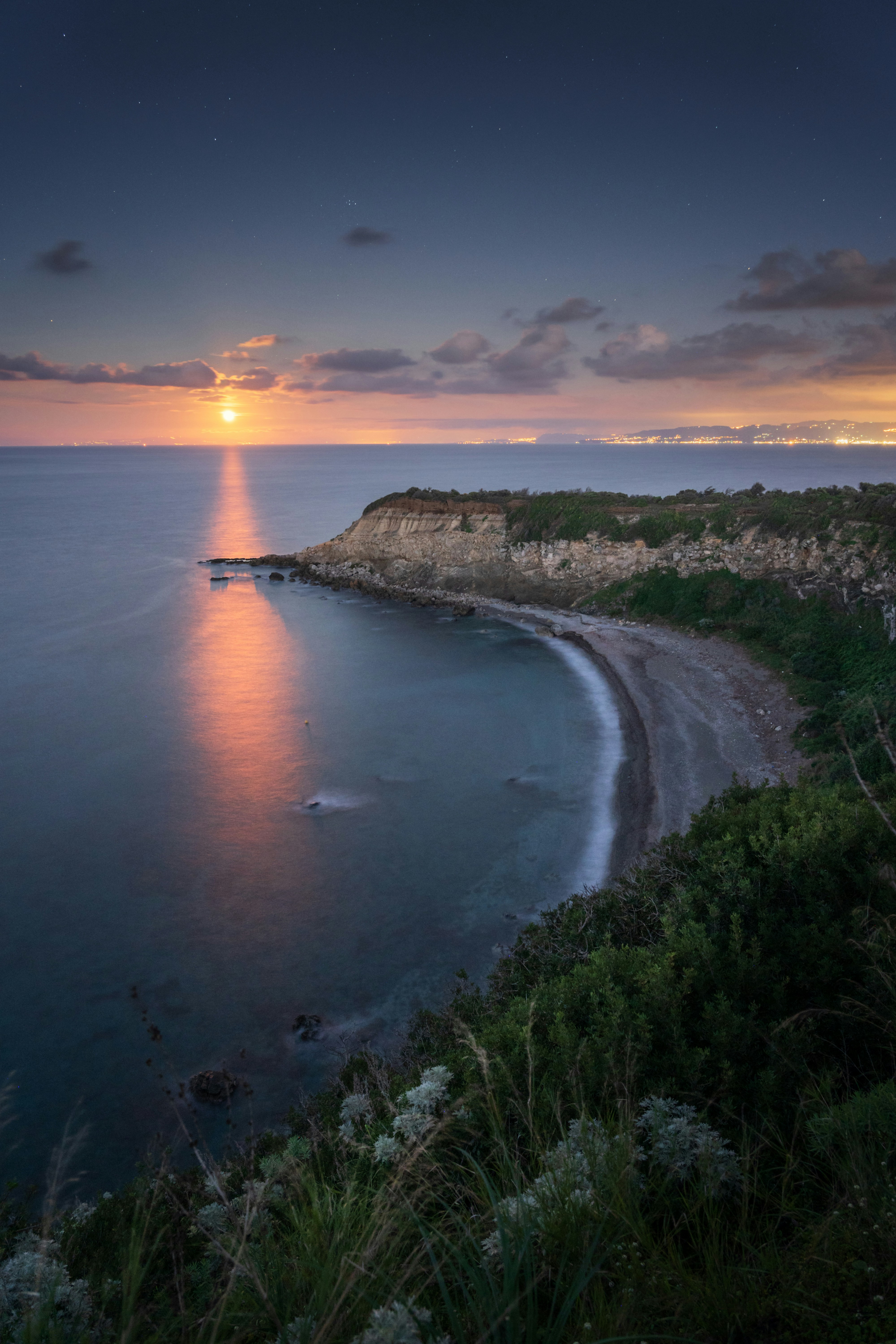 Sunset Lighthouse of the Coastal Cliff