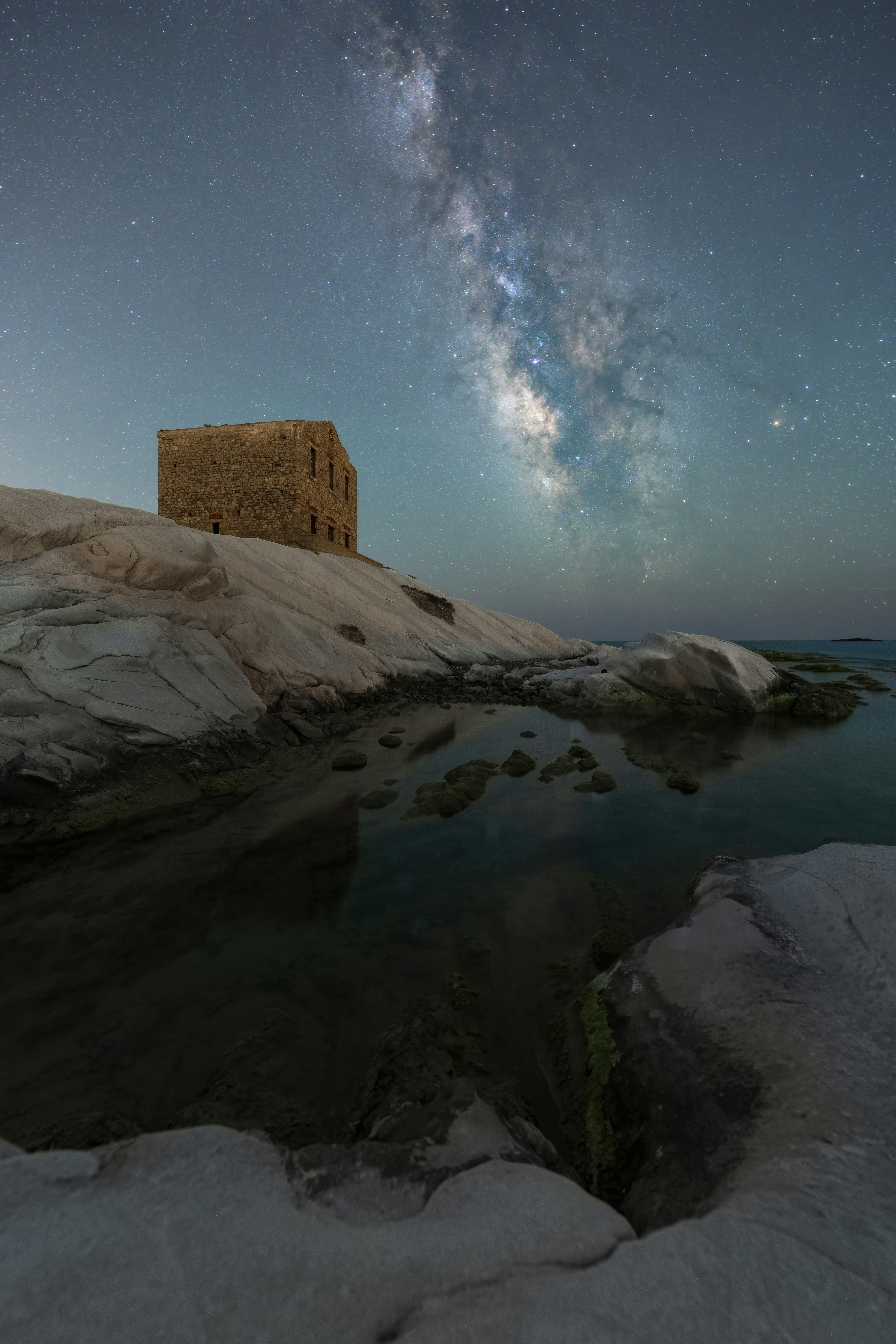 Milky Way Over the Stone Cabin: A Quiet Night by the Tides