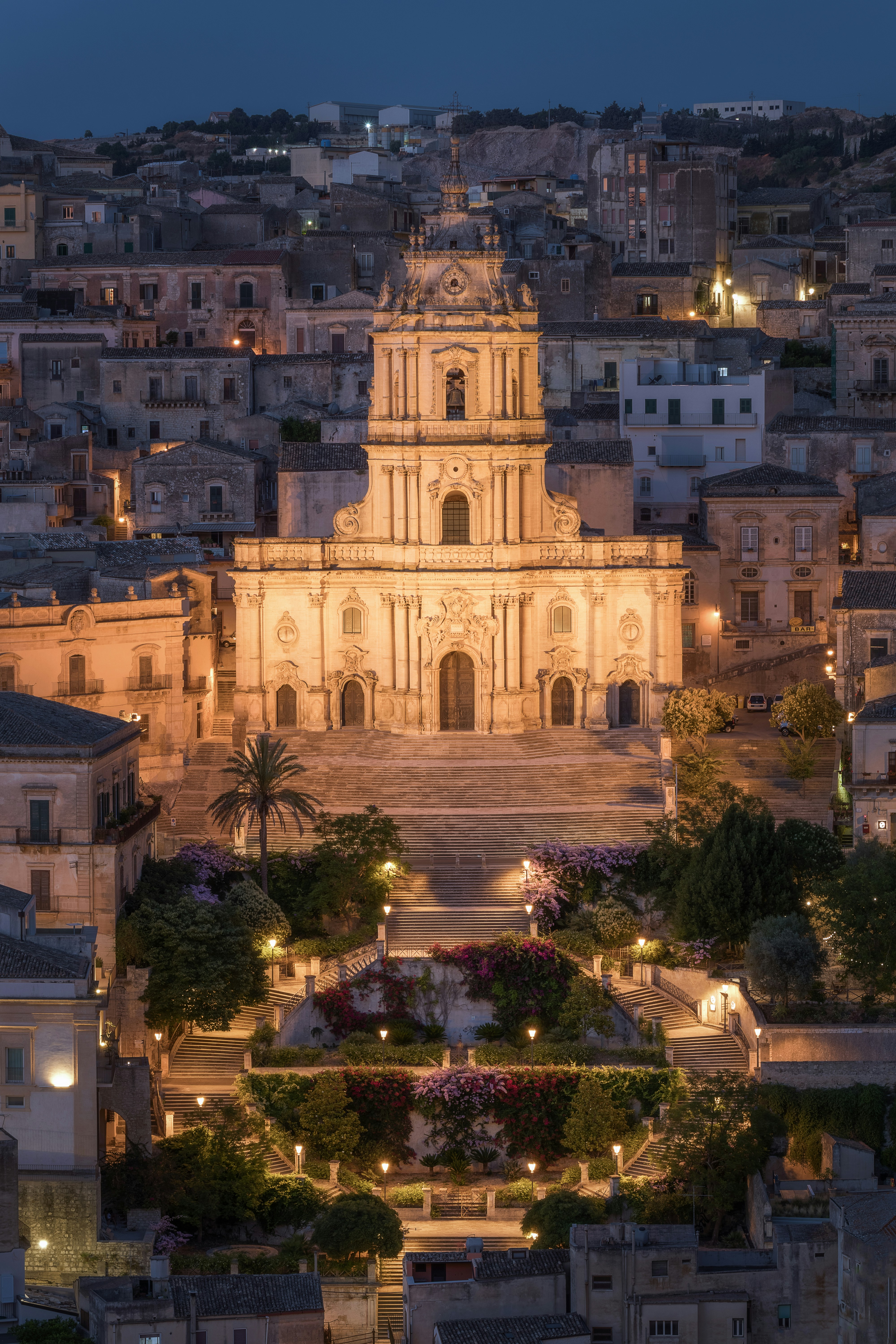 Illuminated Baroque Facade Rising Over Terraced Maufort Town