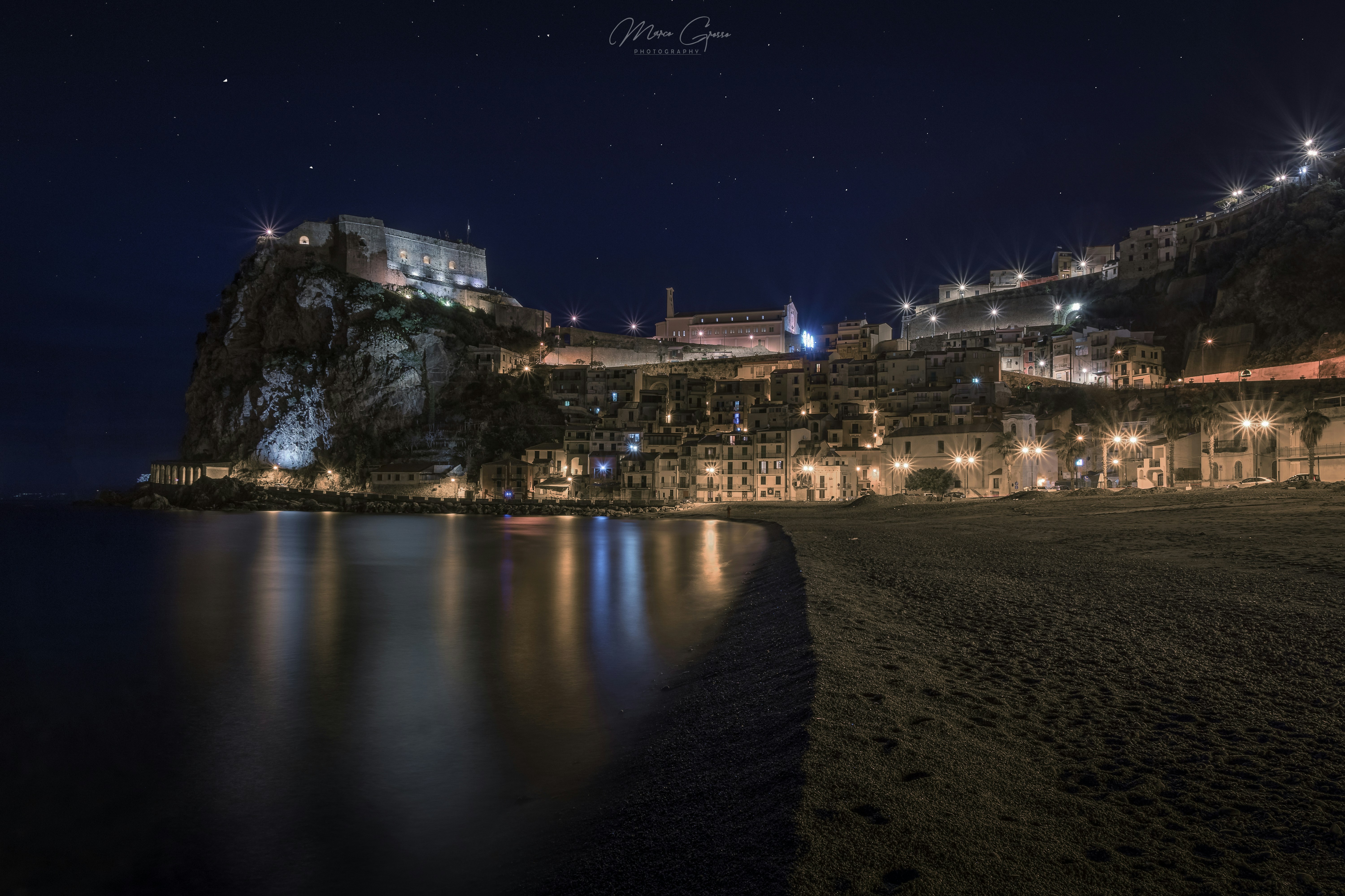 Moonlit Cliffs Over a Quiet Sicilian Night Harbor