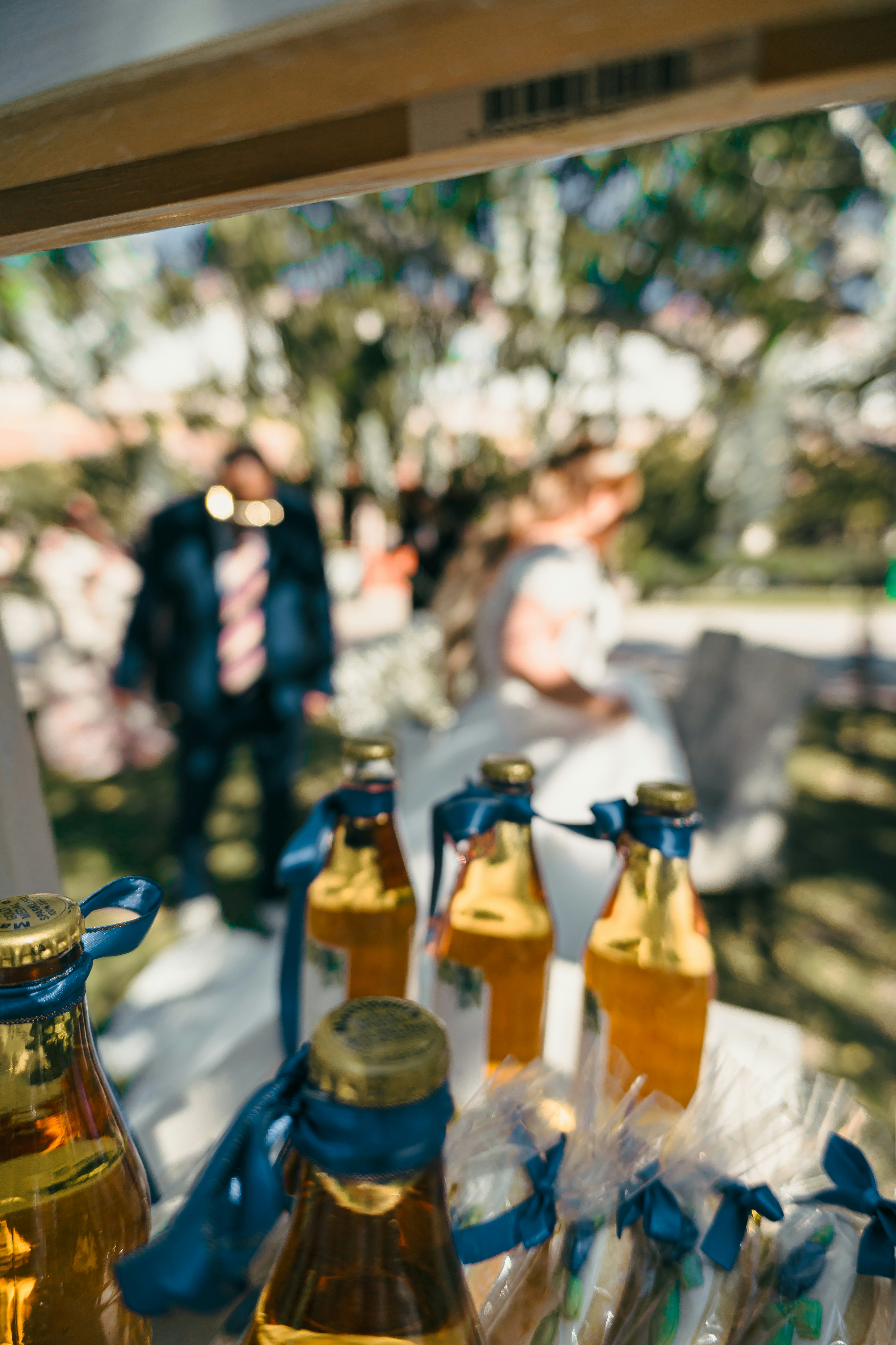 Drinks on Display: Blurred Crowd at a Vintage Reception