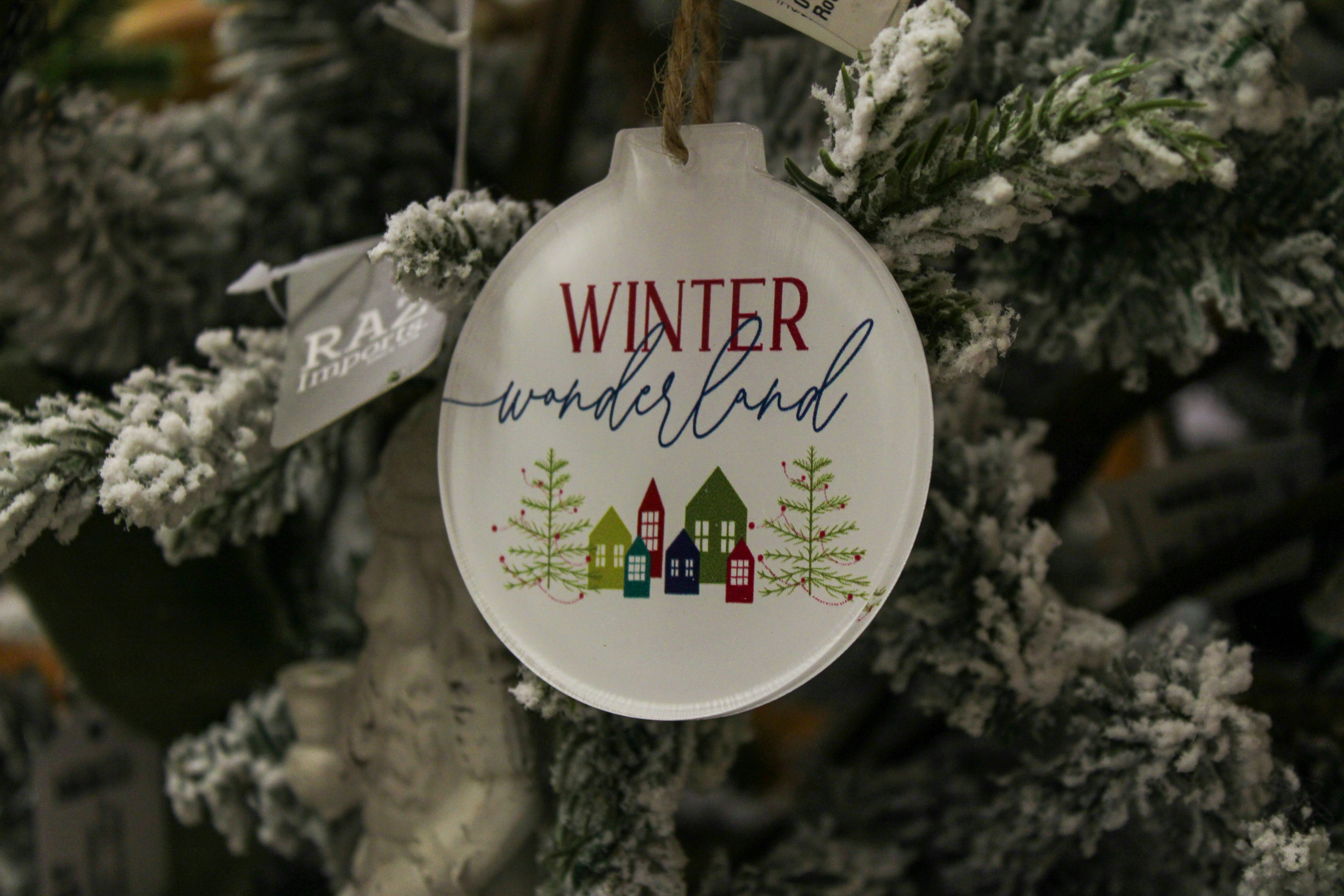 Winter Wonderland Ornament Adorns Frosted Branches