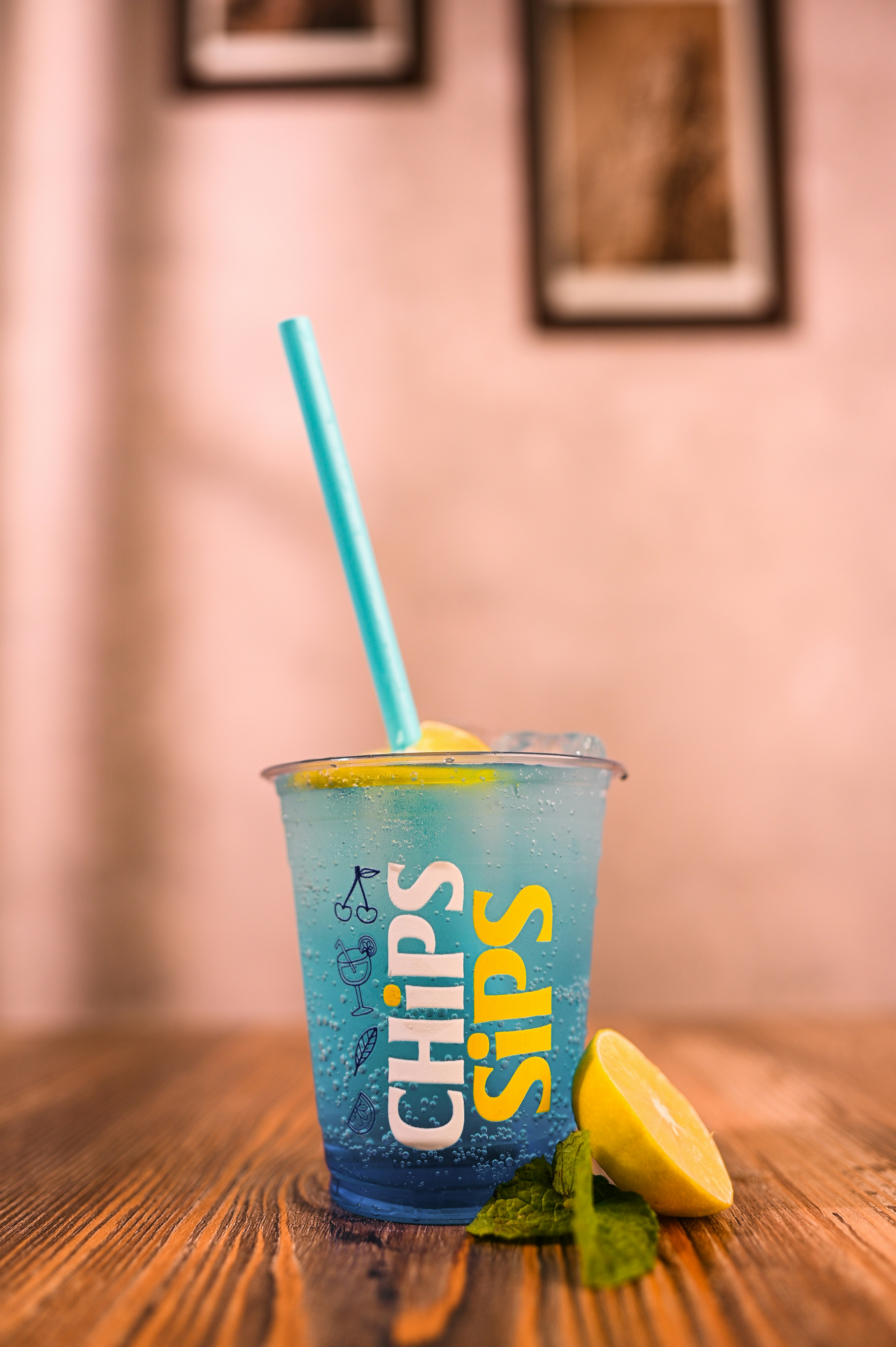 Blue Lemonade, Bright Focus: A Citrus Sip on a Wooden Stage