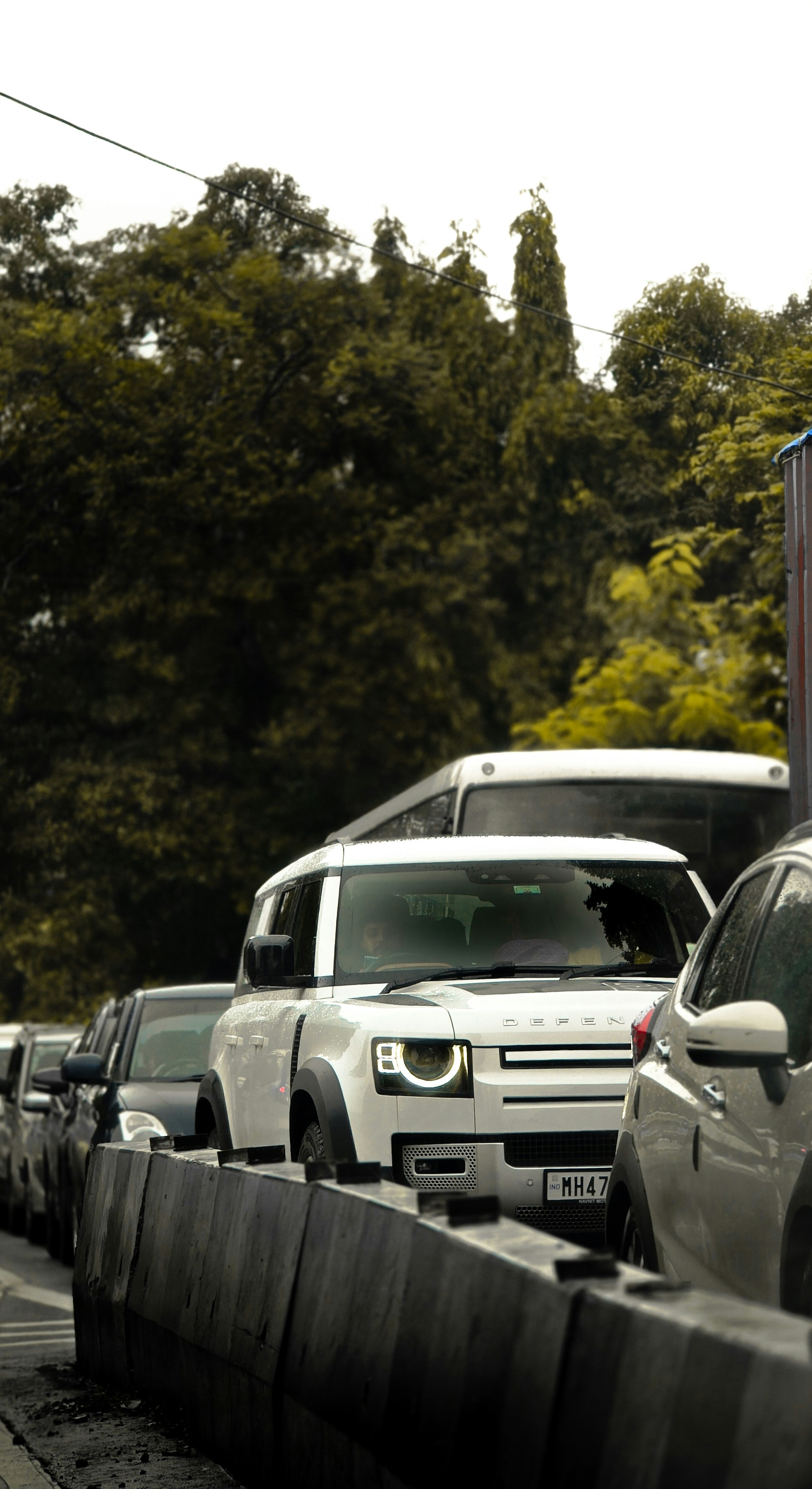Line of Steel: A White SUV Leads the Morning Traffic Block