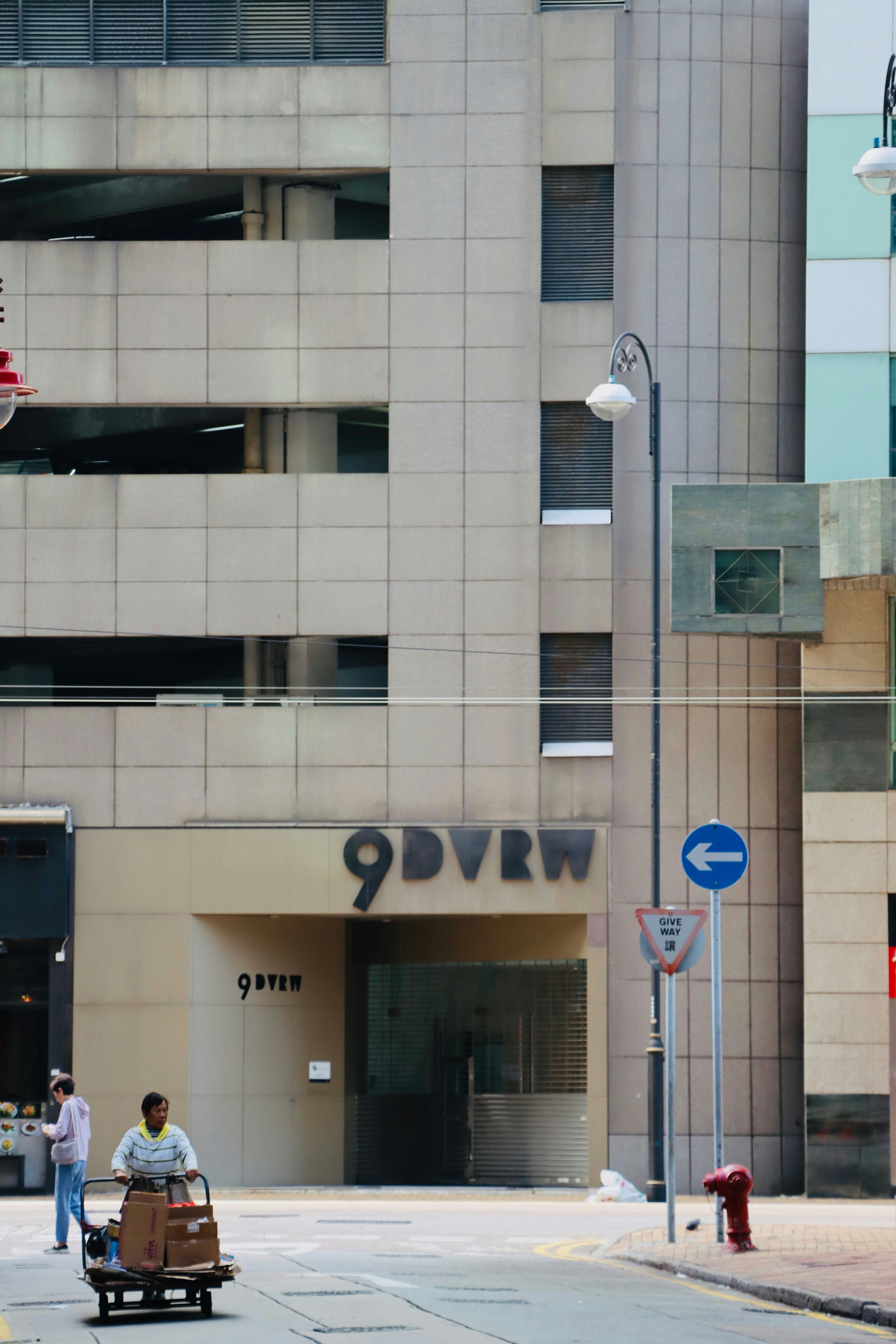 Urban Quiet: A Sidewalk Moment by 9DVRW