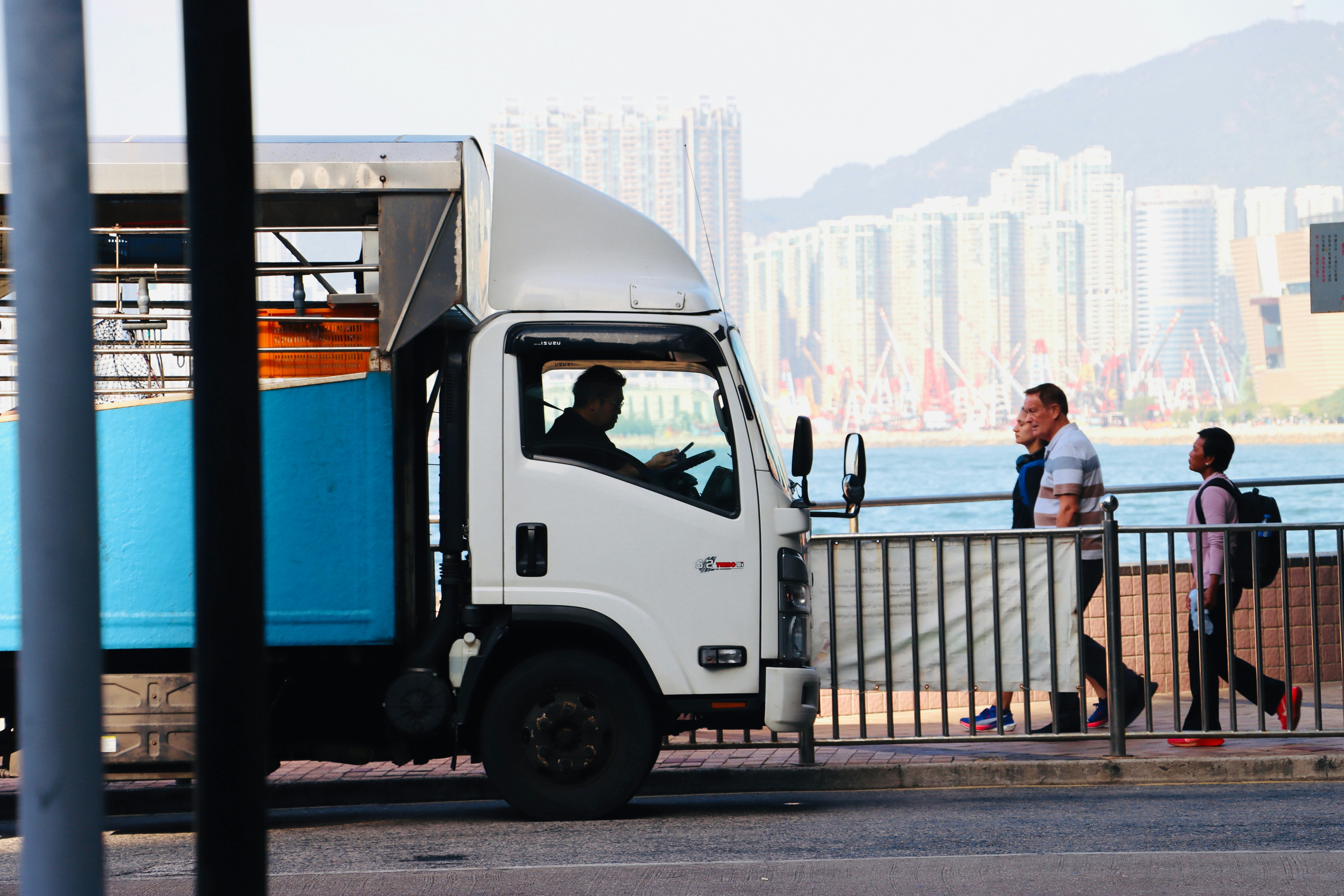 The Turning Point: Cargo Truck, Seashore Promenade, and City Awe