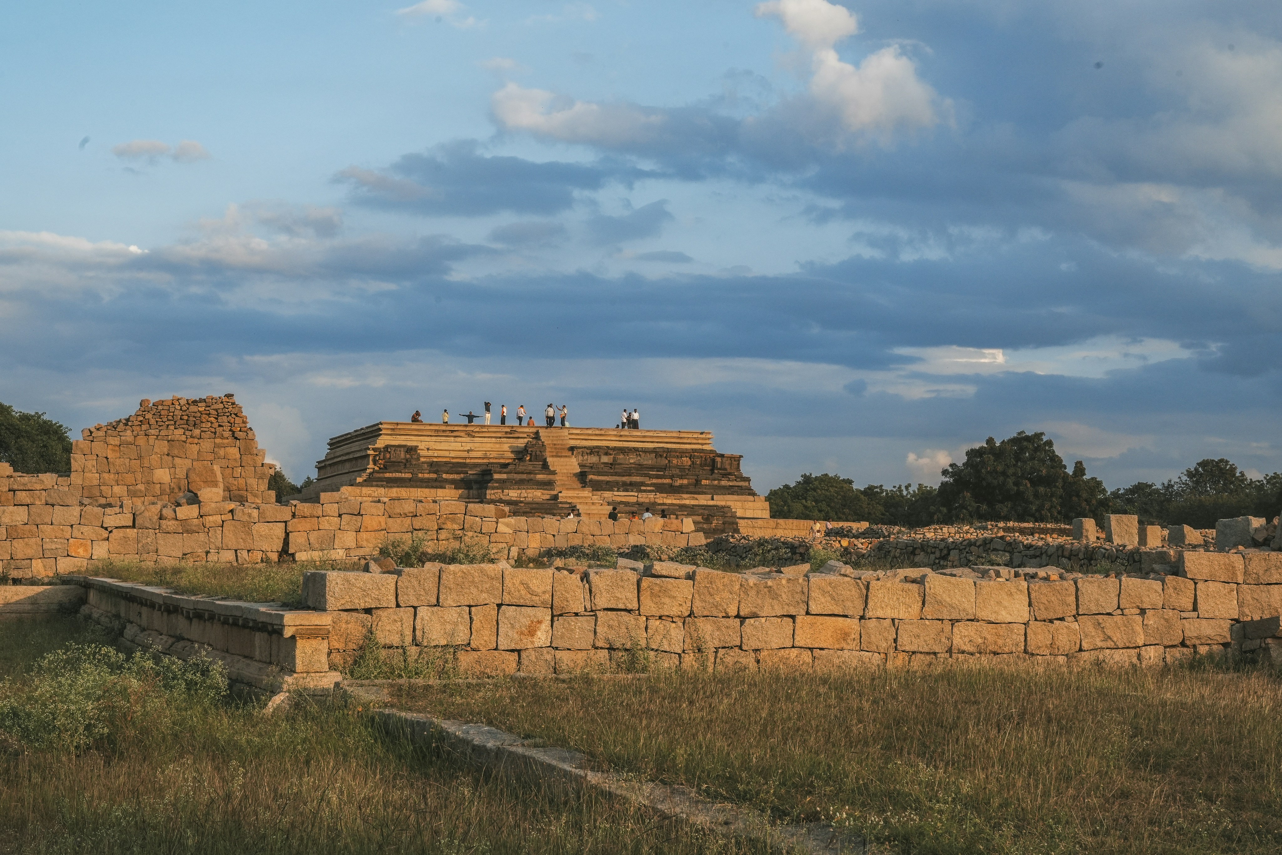 Sunlit Terraced Ruins Under A Wide Sky