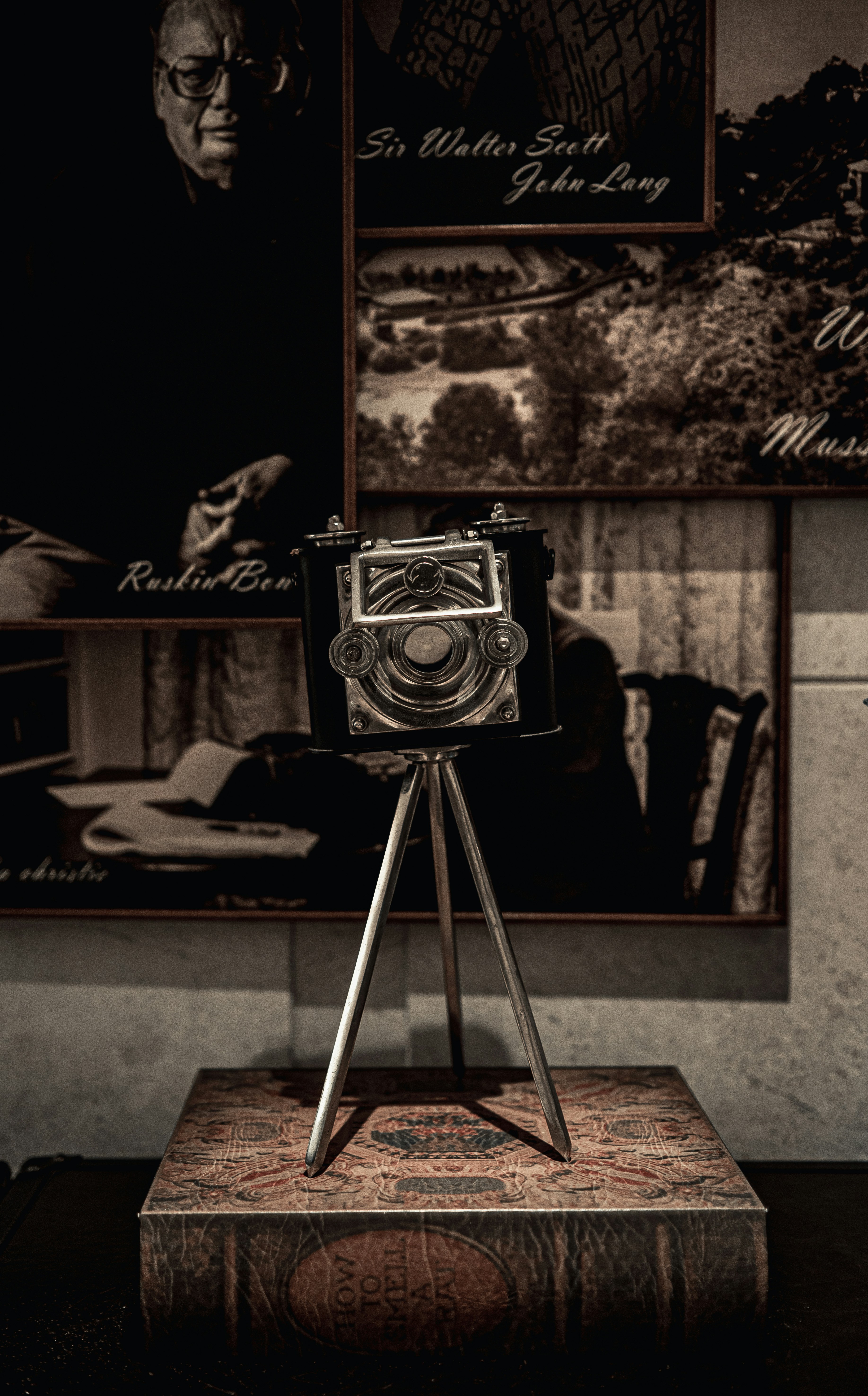 A Timeless Lens: Vintage Camera Steady on a Cardboard Stage