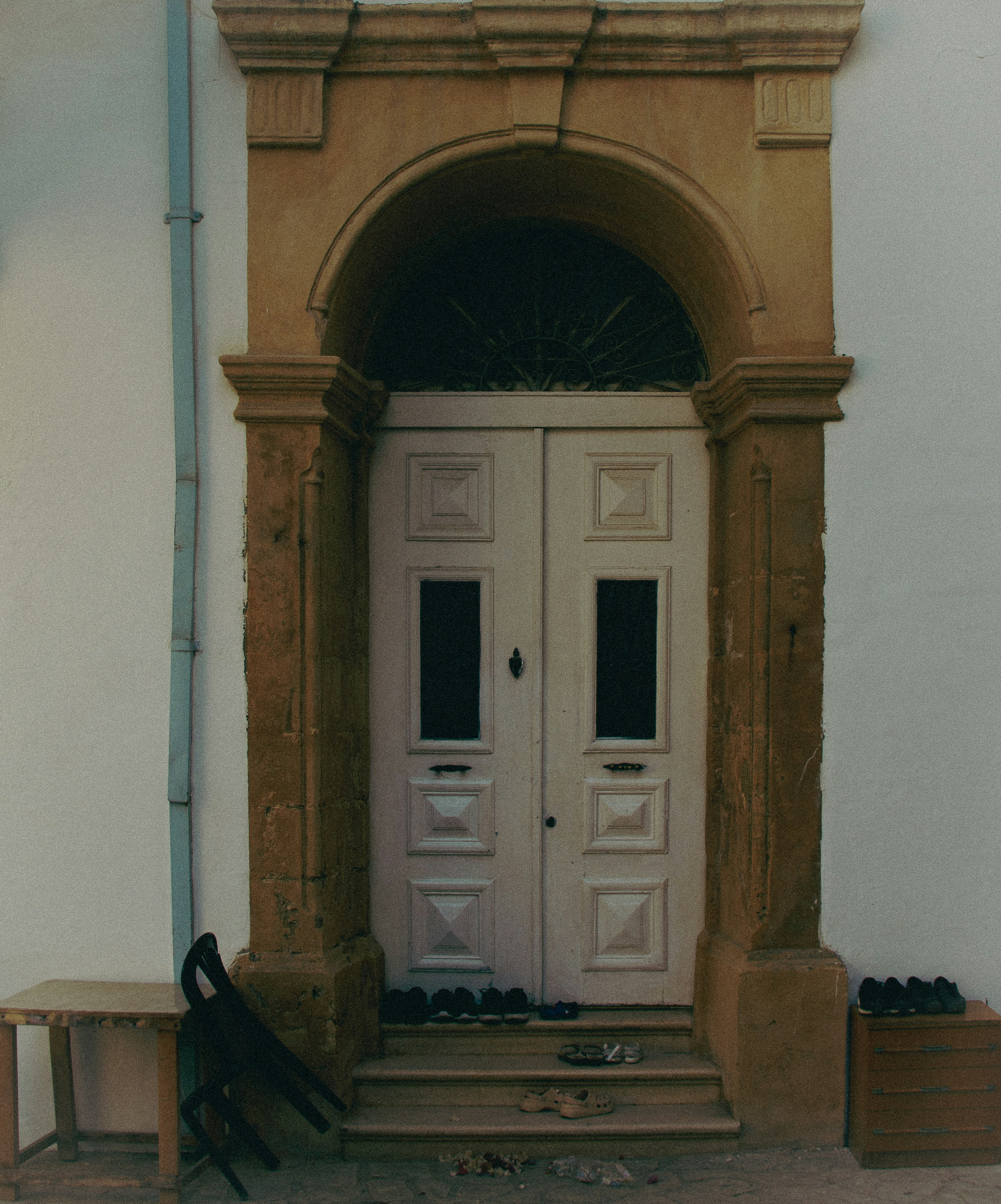 Arched Entrance with Weathered Doorway