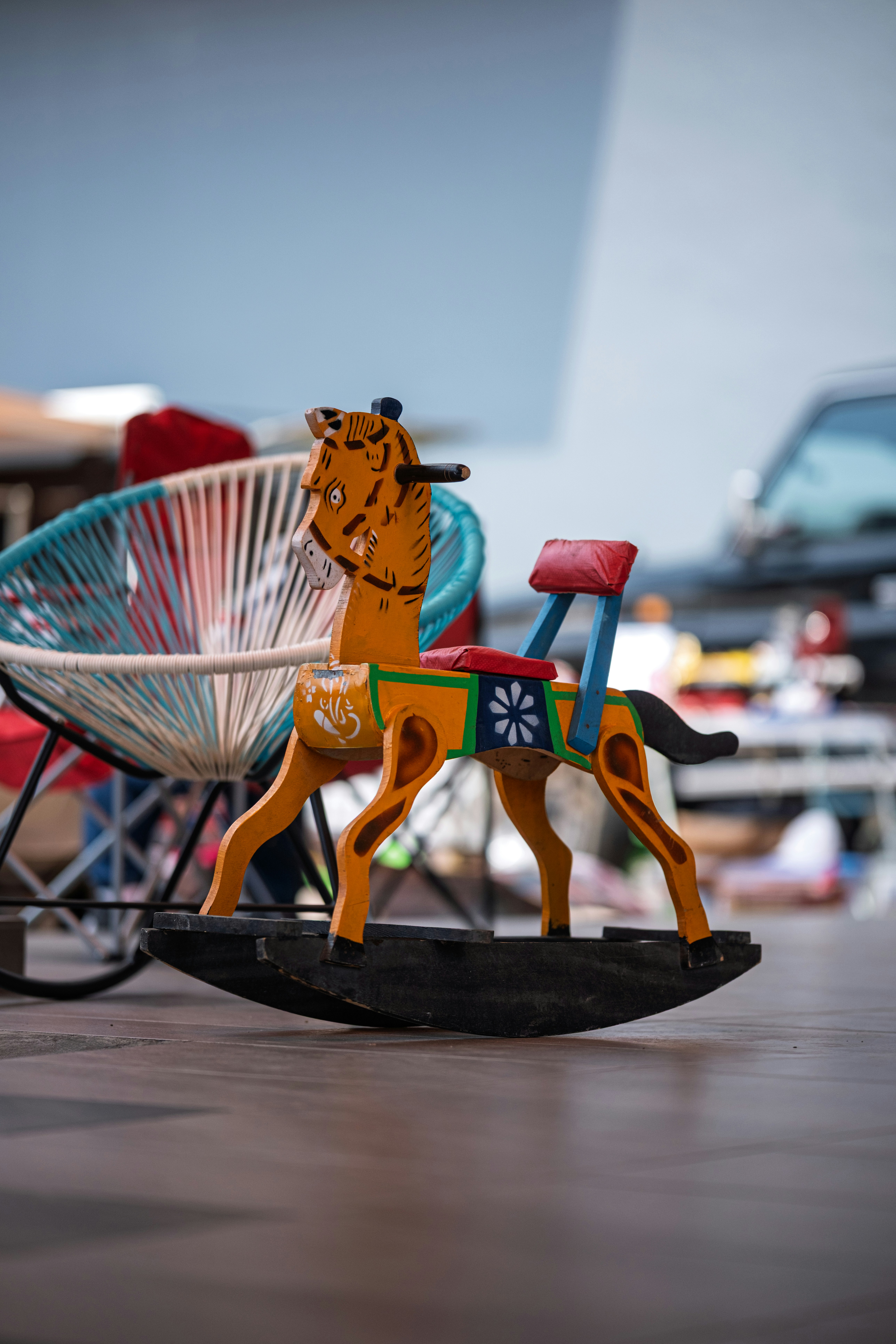 Colorful Wooden Rocking Horse at a Flea Market