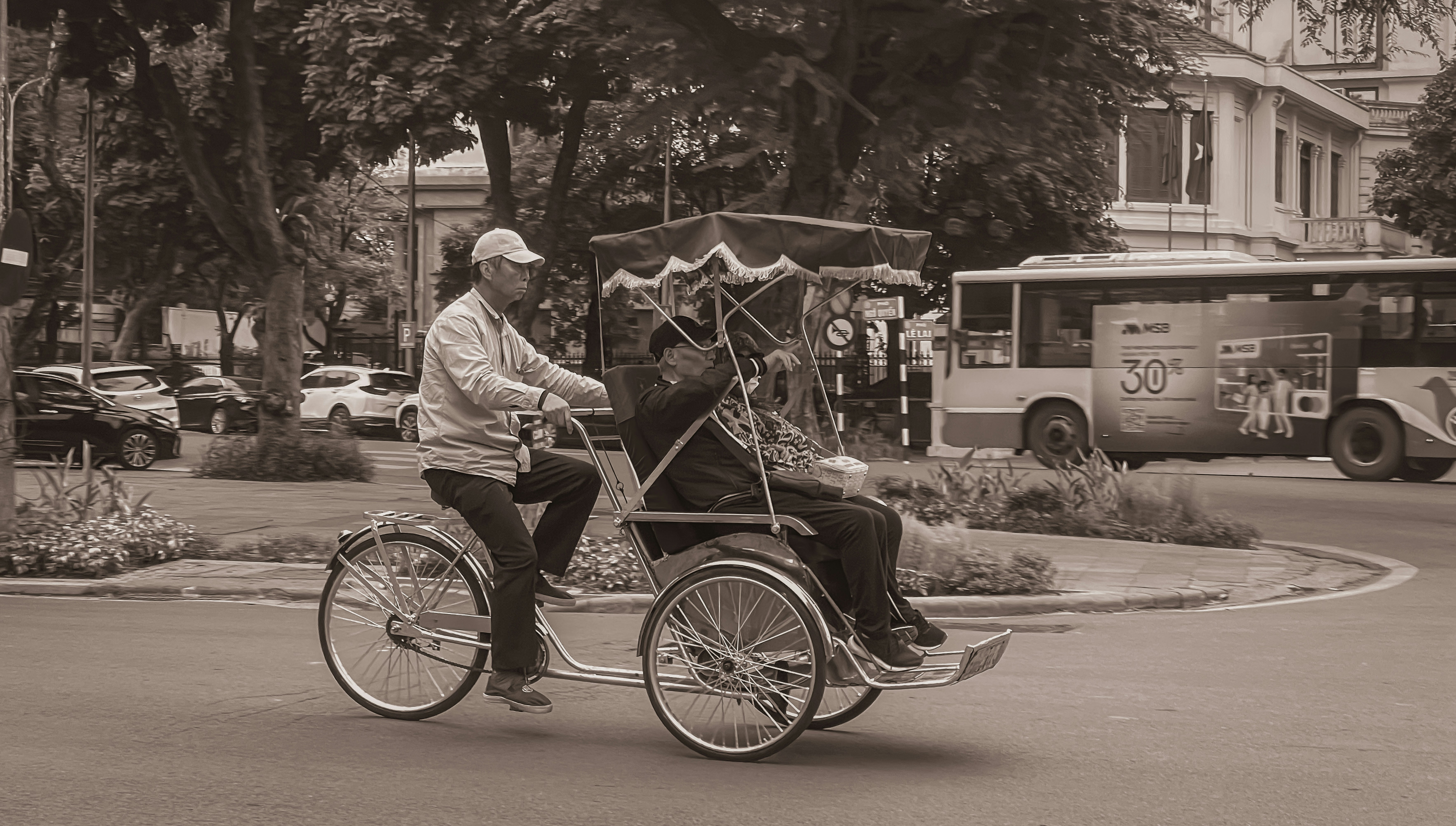 Pedicab in Motion: A Quiet Street Portrait