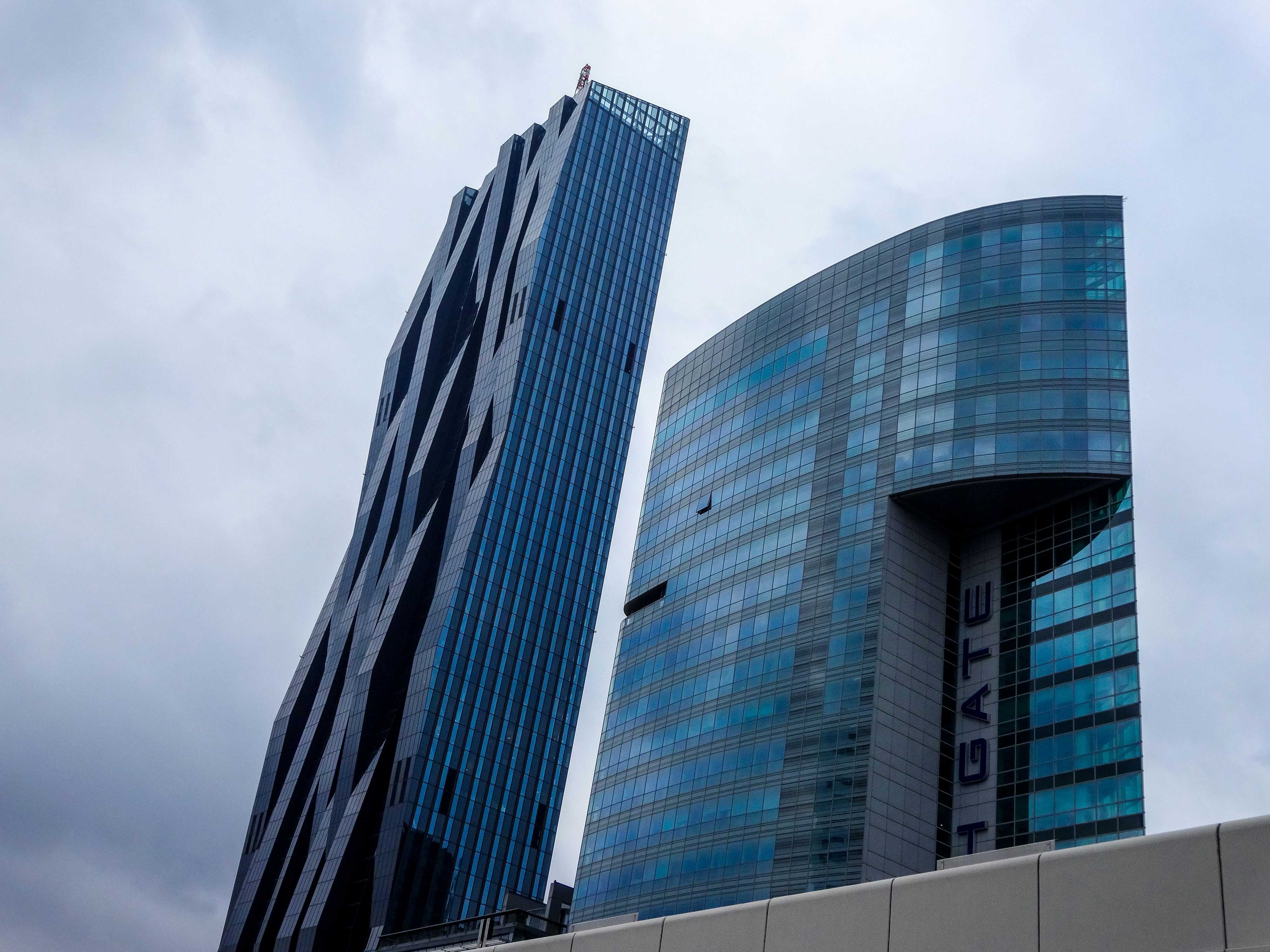 Skyscraper Echo: Blue Facades Leaning Toward the Sky