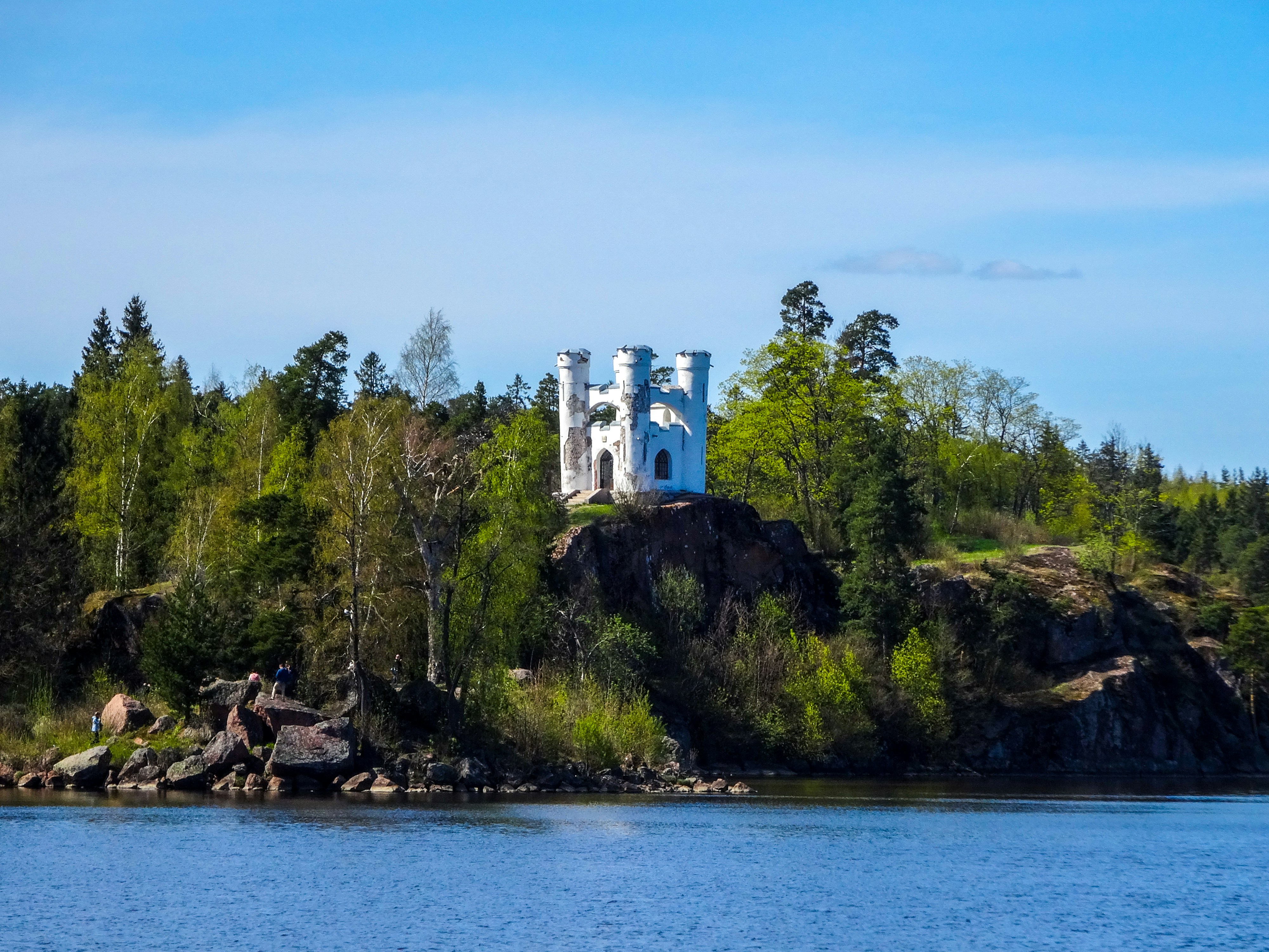 Ruined White Tower Reaching Toward a Blue Sky