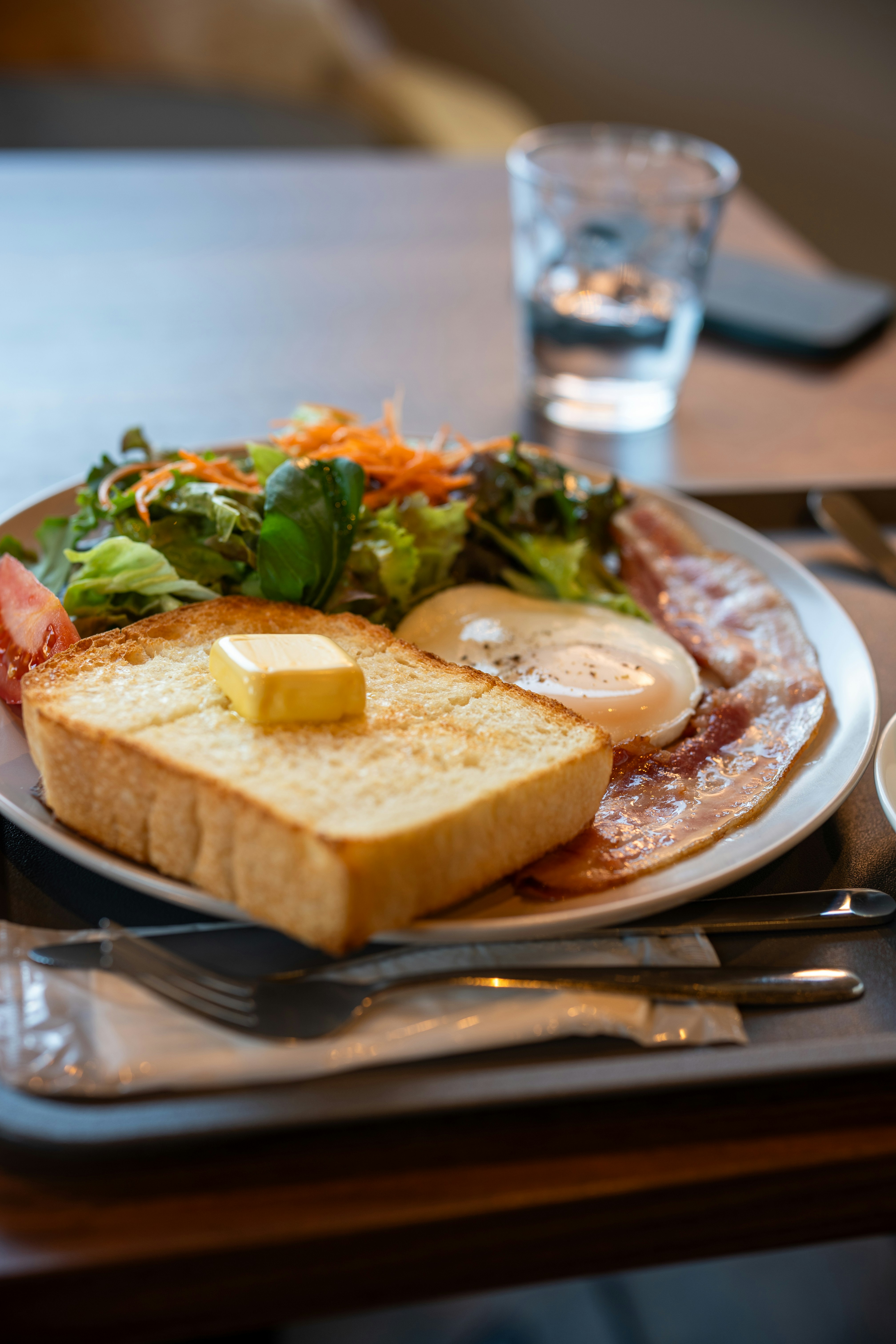 Golden Toast and Sunrise Ham: A Cozy plated breakfast with greens and a sunny yolk
